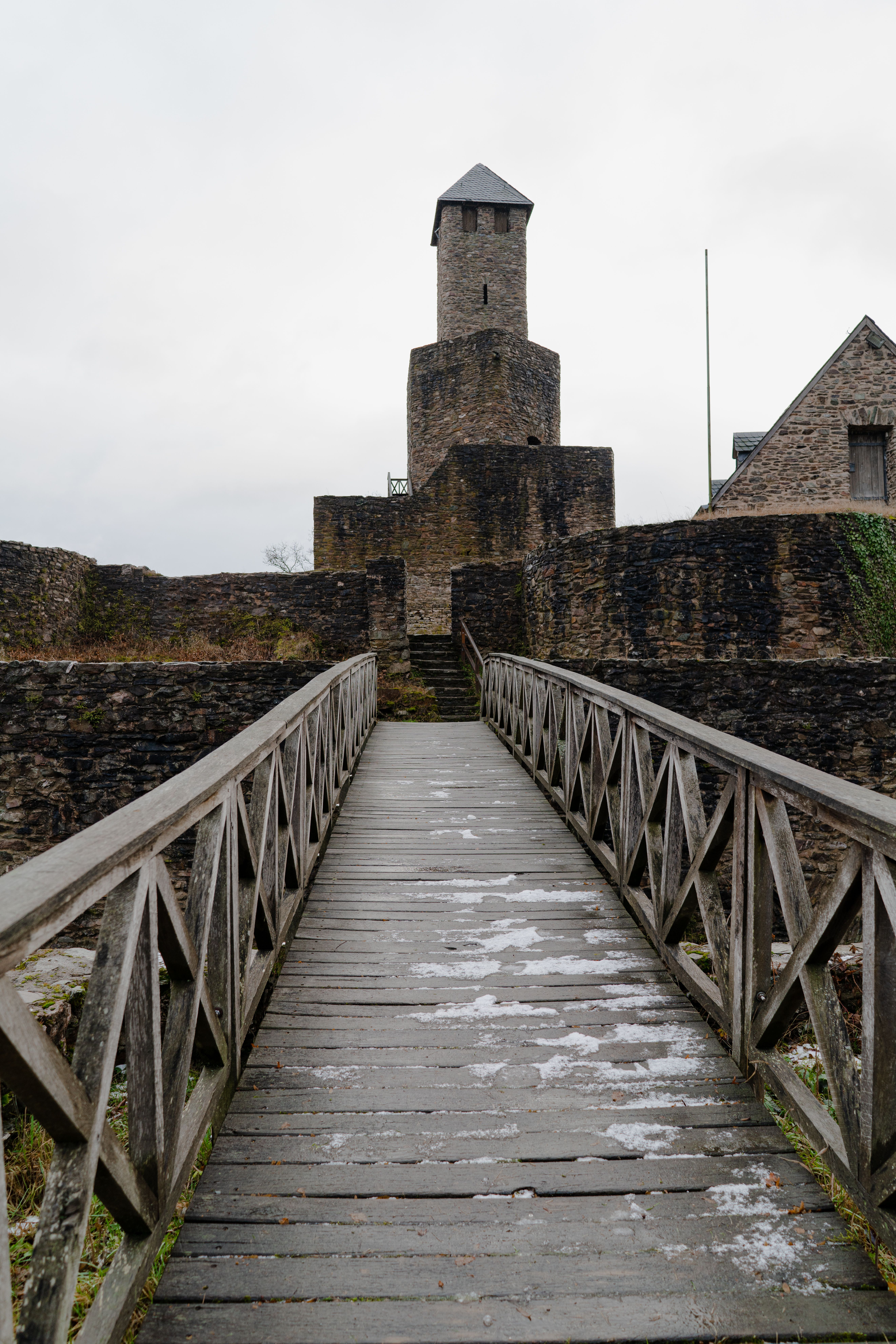 Medieval castle located near bridge in countryside · Free Stock Photo