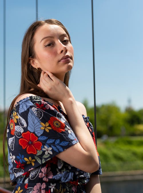Woman In Blue Off Shoulder Dress Standing Beside The Railings · Free