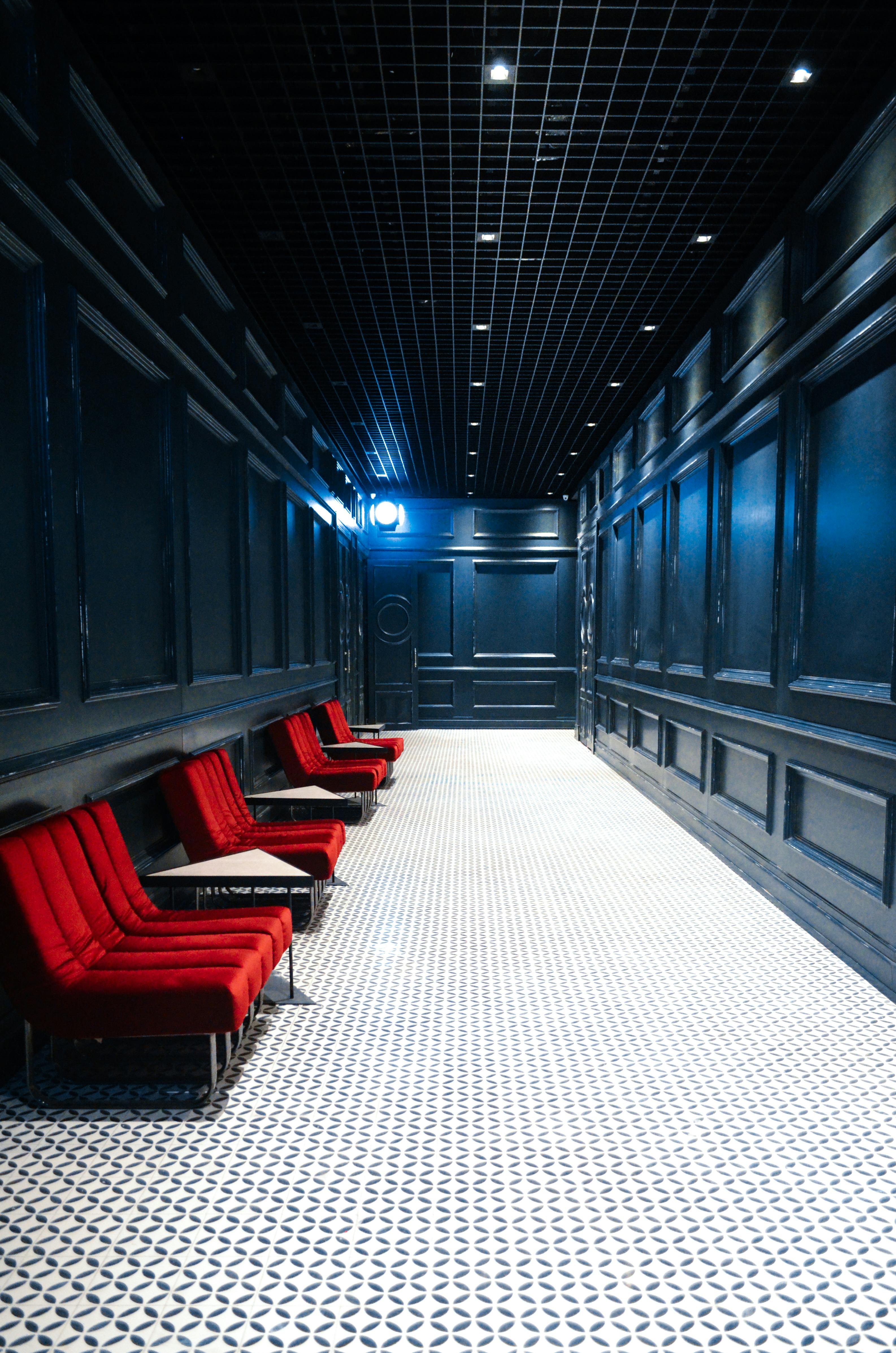 Empty hall with couches and tables in building · Free Stock Photo