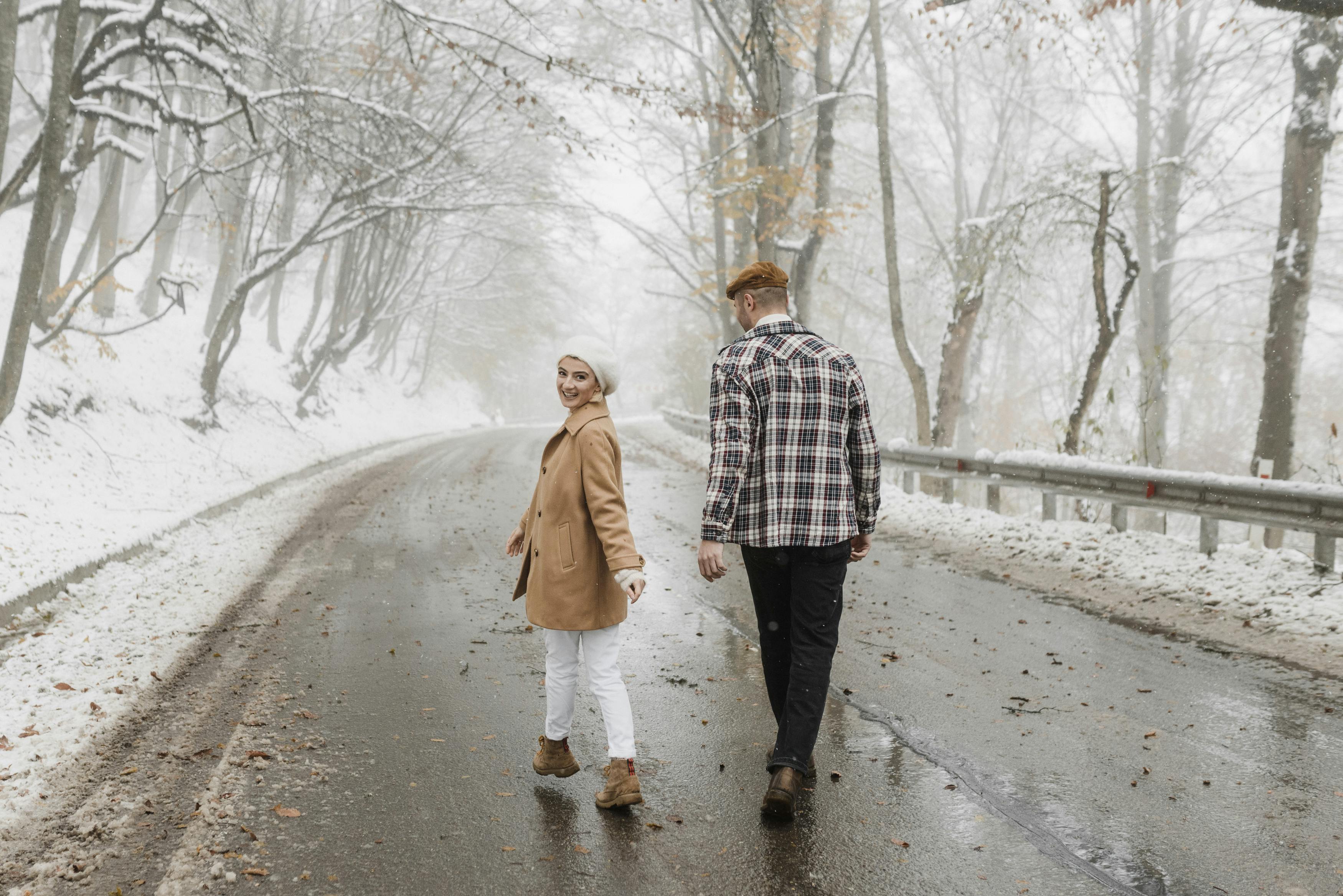 Couple Walking on the Road Together · Free Stock Photo