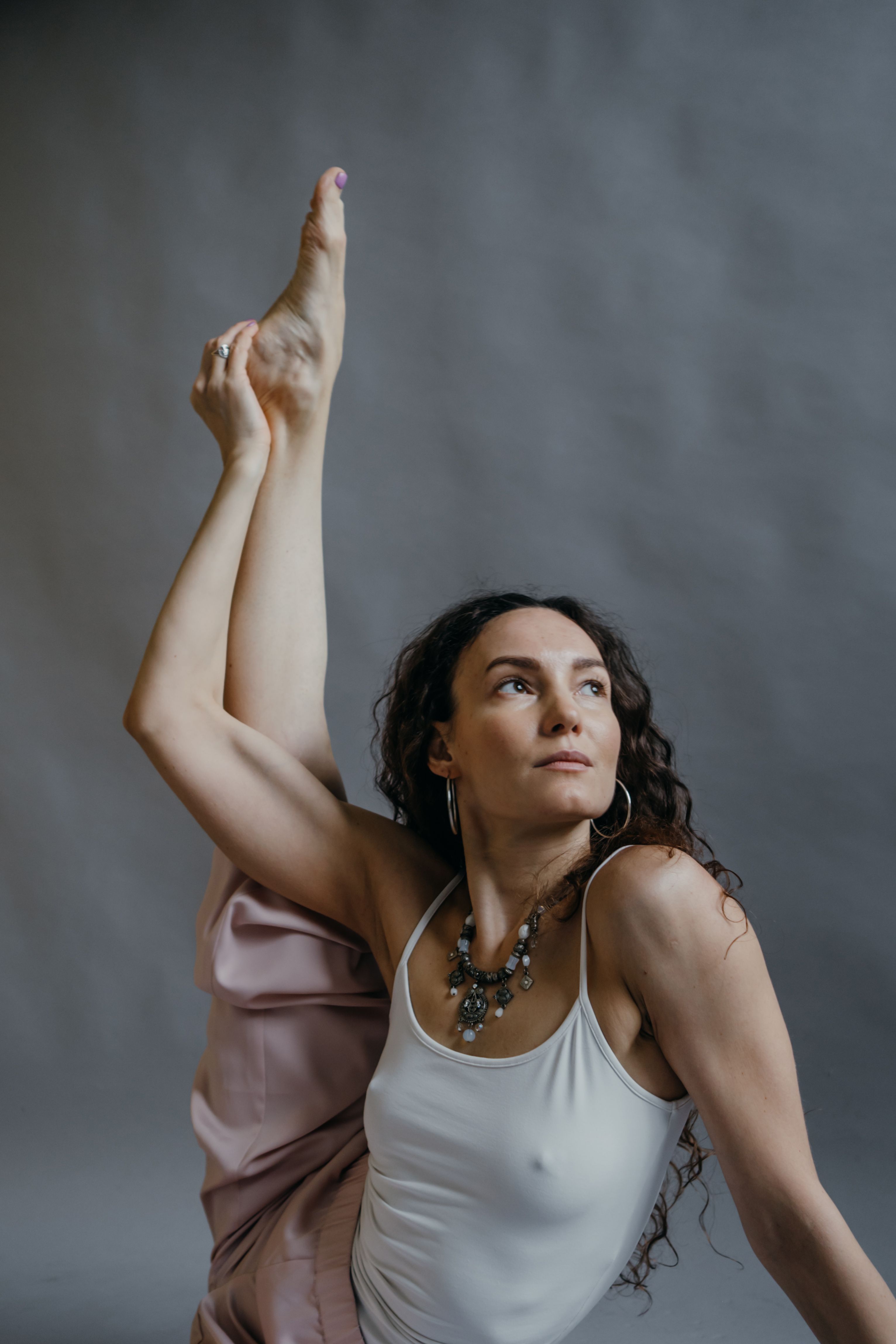 Flexible Woman Stretching Her Leg · Free Stock Photo