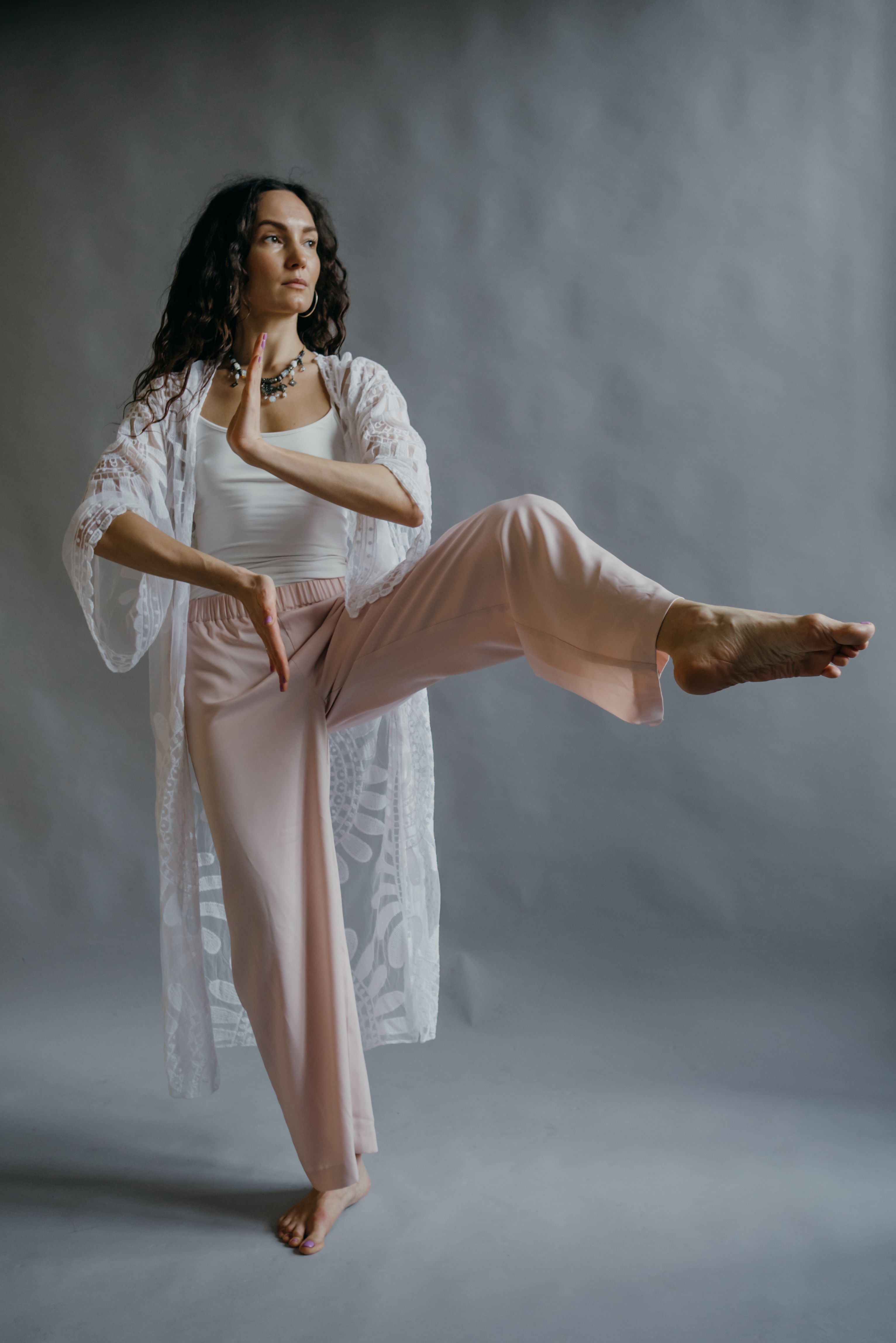 Woman Raising Her Leg While Meditating · Free Stock Photo