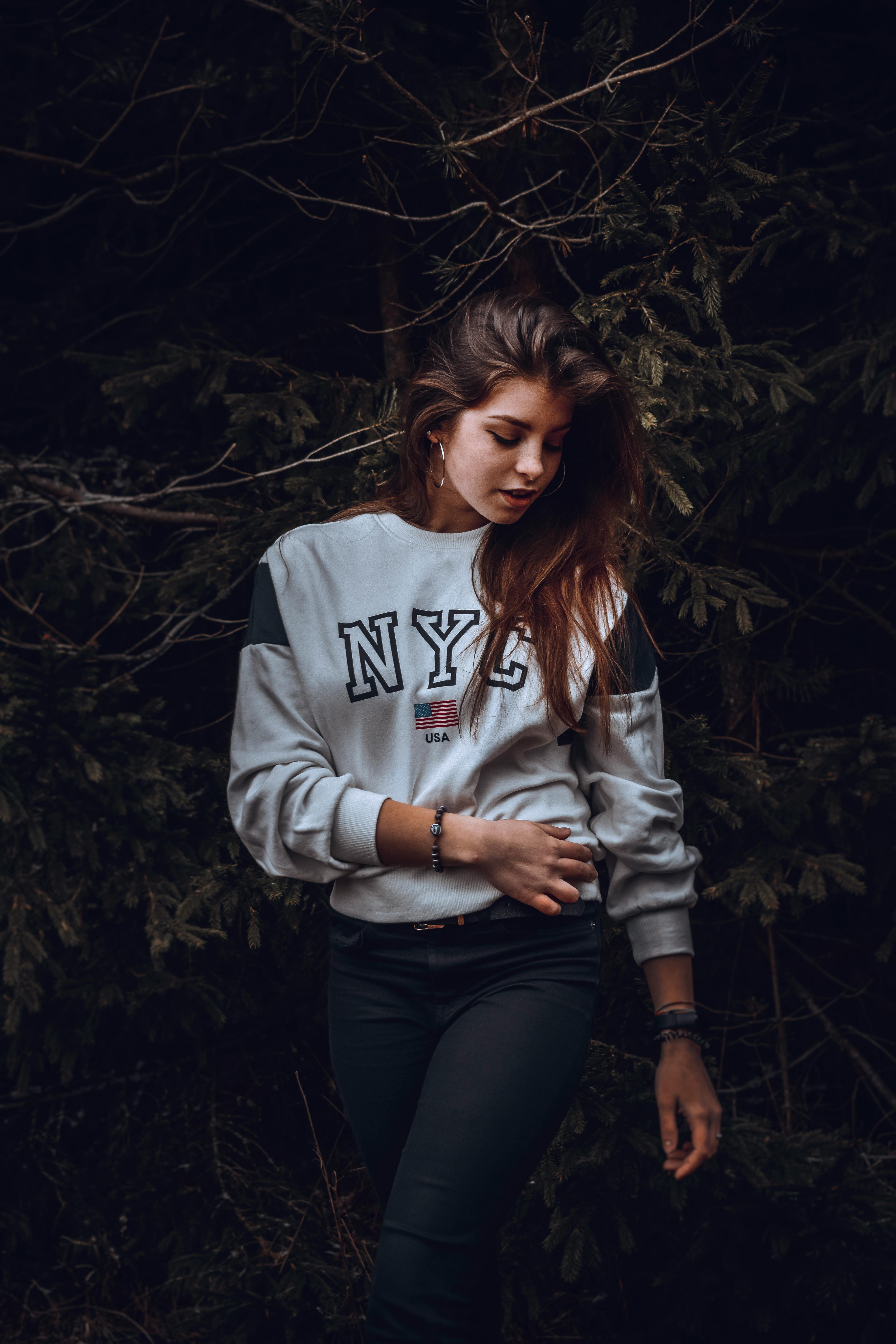 Woman Standing in Hallway · Free Stock Photo