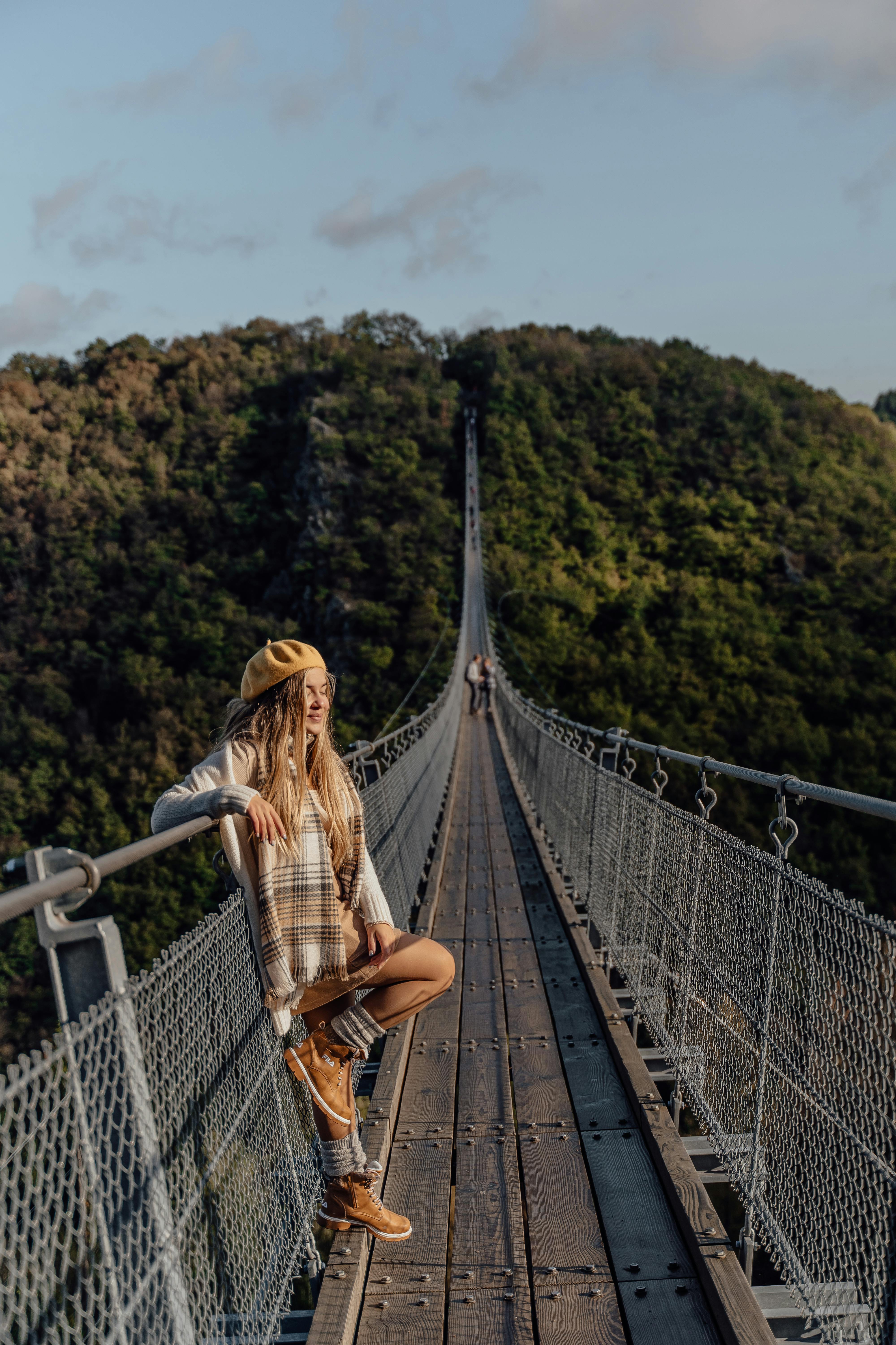 Woman Posing on Hanging Bridge · Free Stock Photo