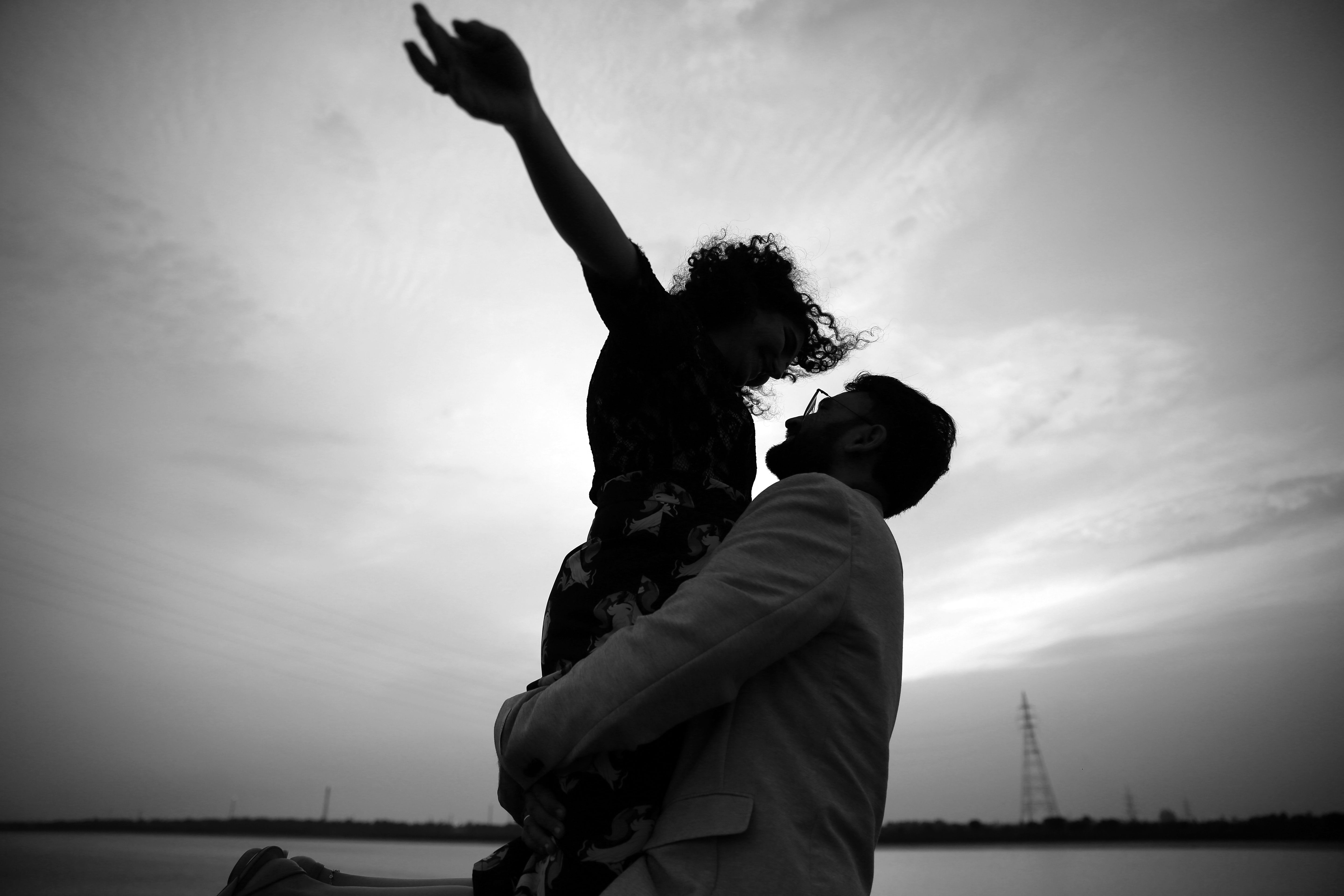 Monochrome Shot of a Lovely Couple · Free Stock Photo