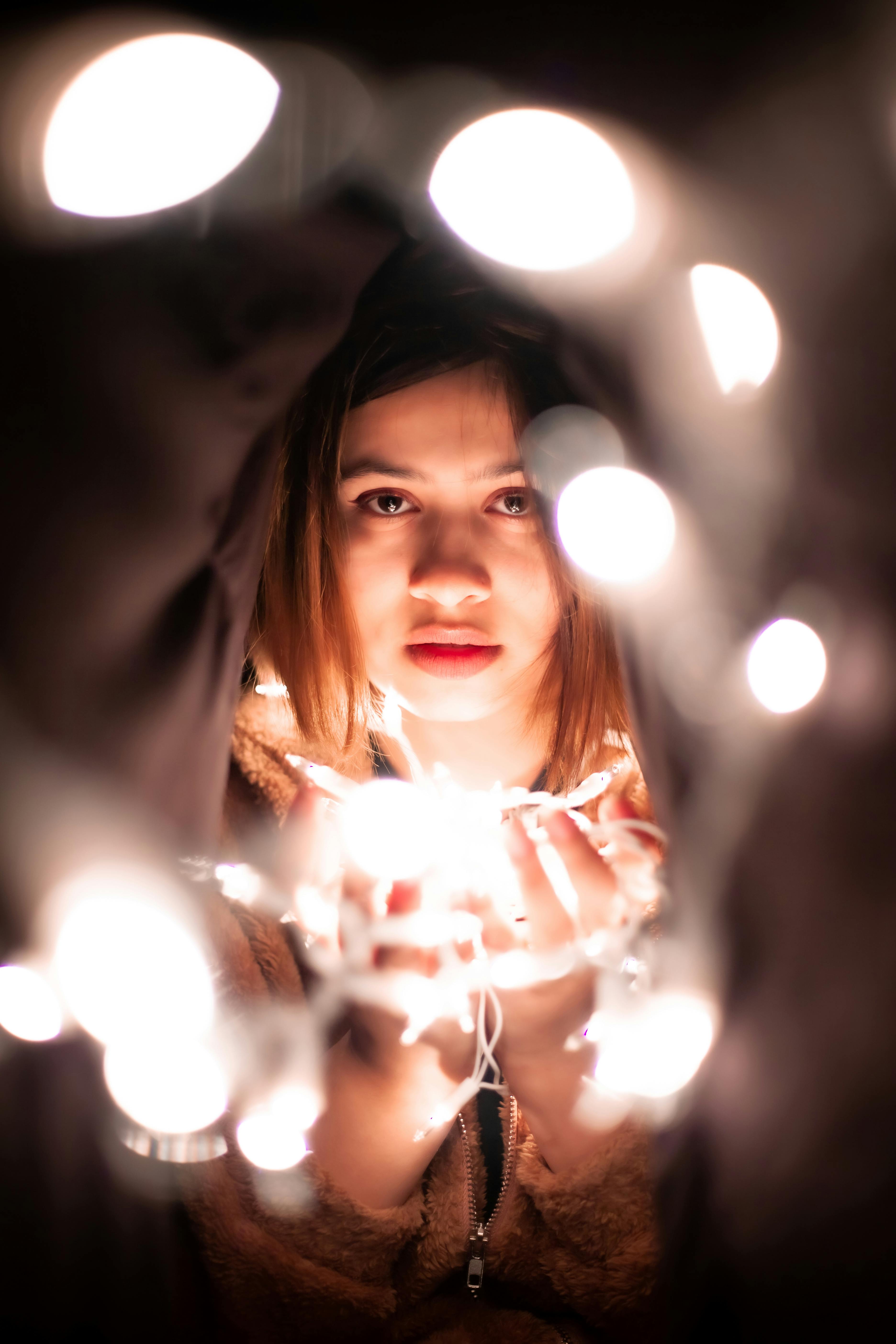 Woman Holding Fairy Lights · Free Stock Photo