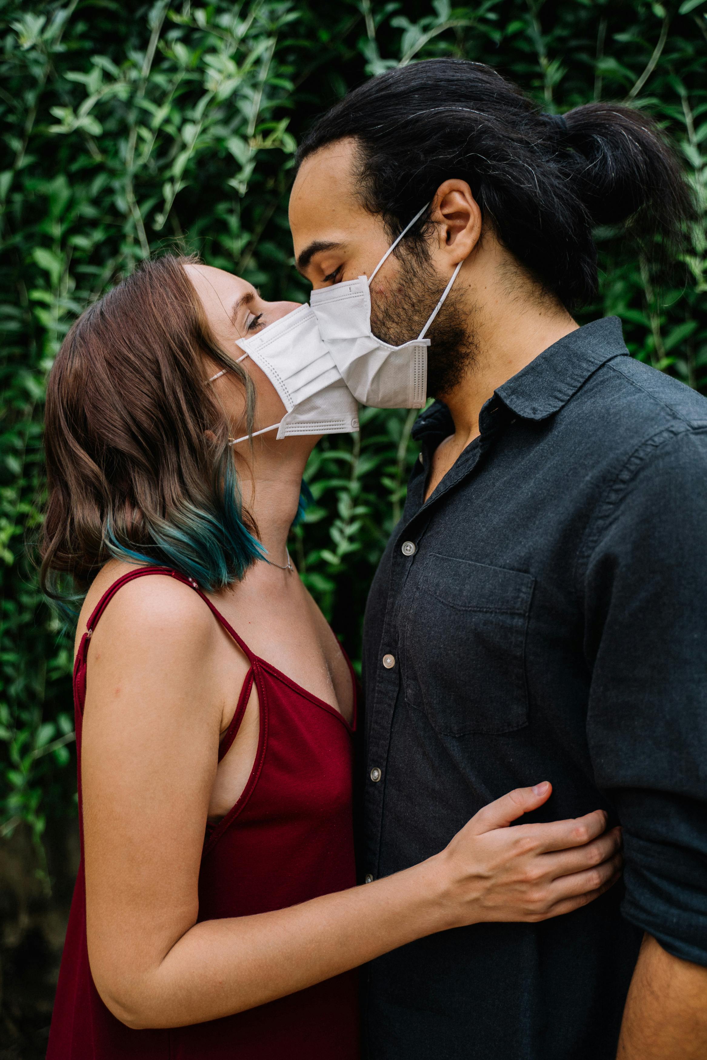 Couple Wearing Face Masks Kissing · Free Stock Photo
