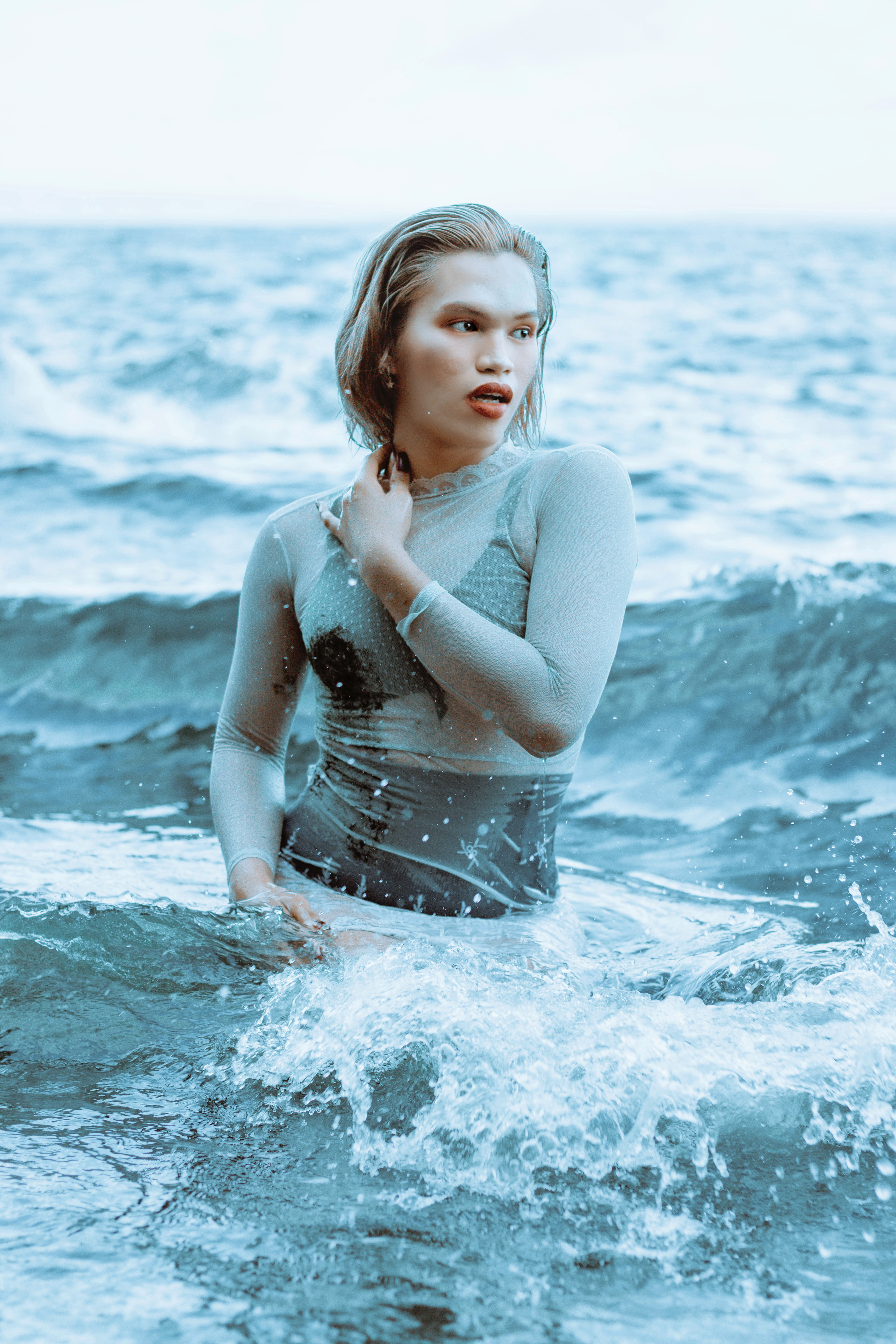 Young woman in sea water · Free Stock Photo