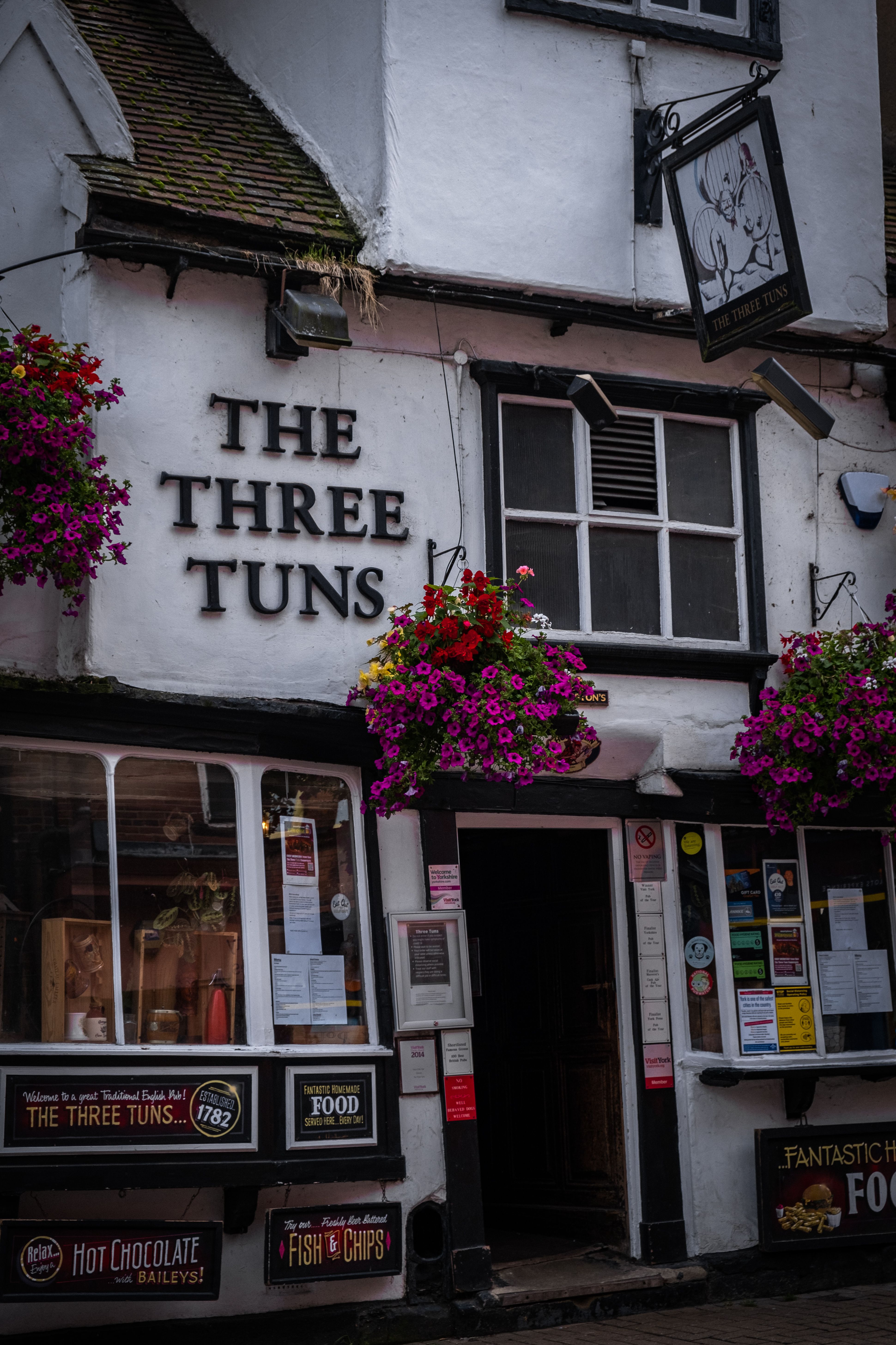 A Building with Business Signages · Free Stock Photo