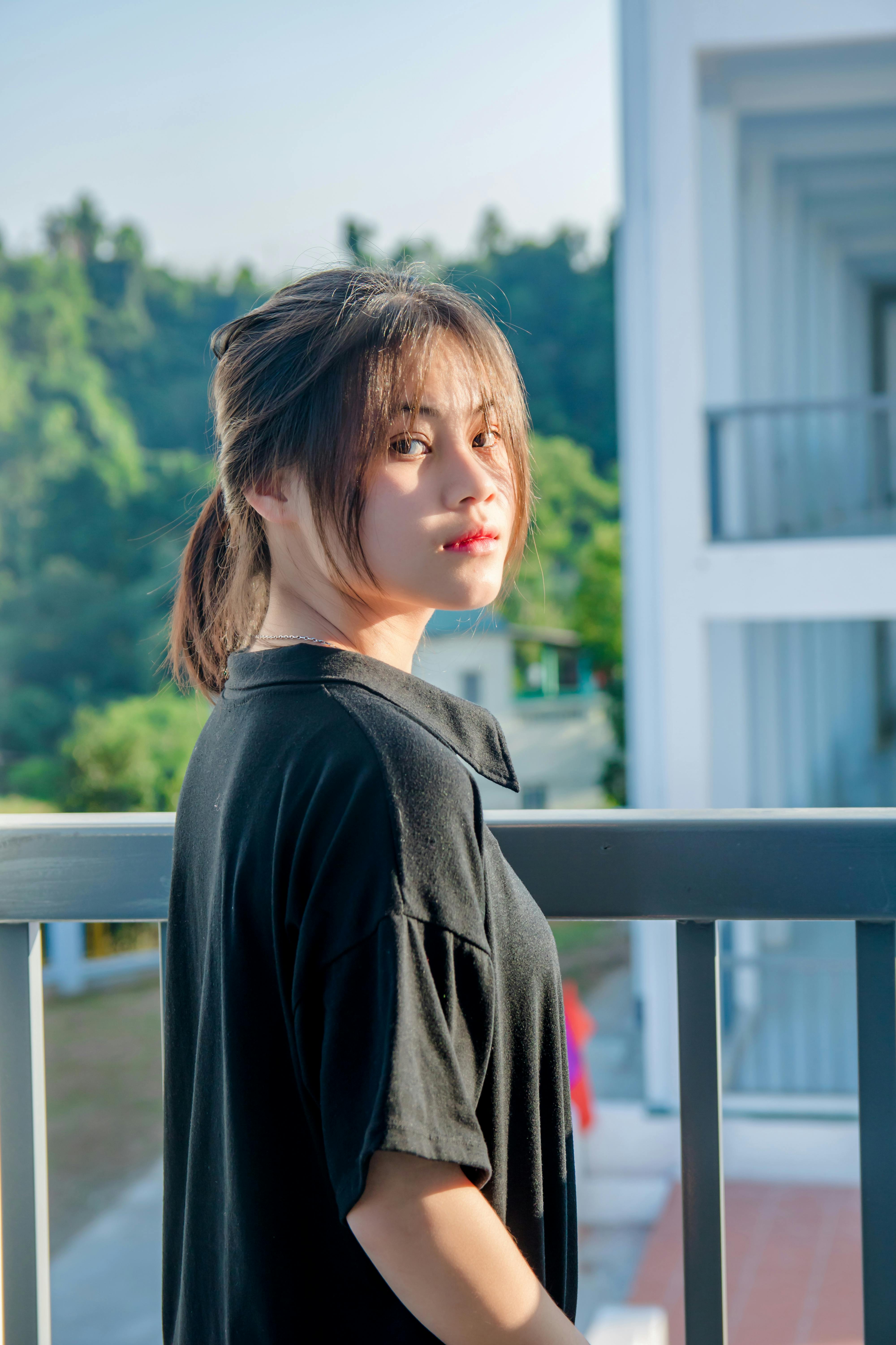 Woman Looking Back at the Camera · Free Stock Photo