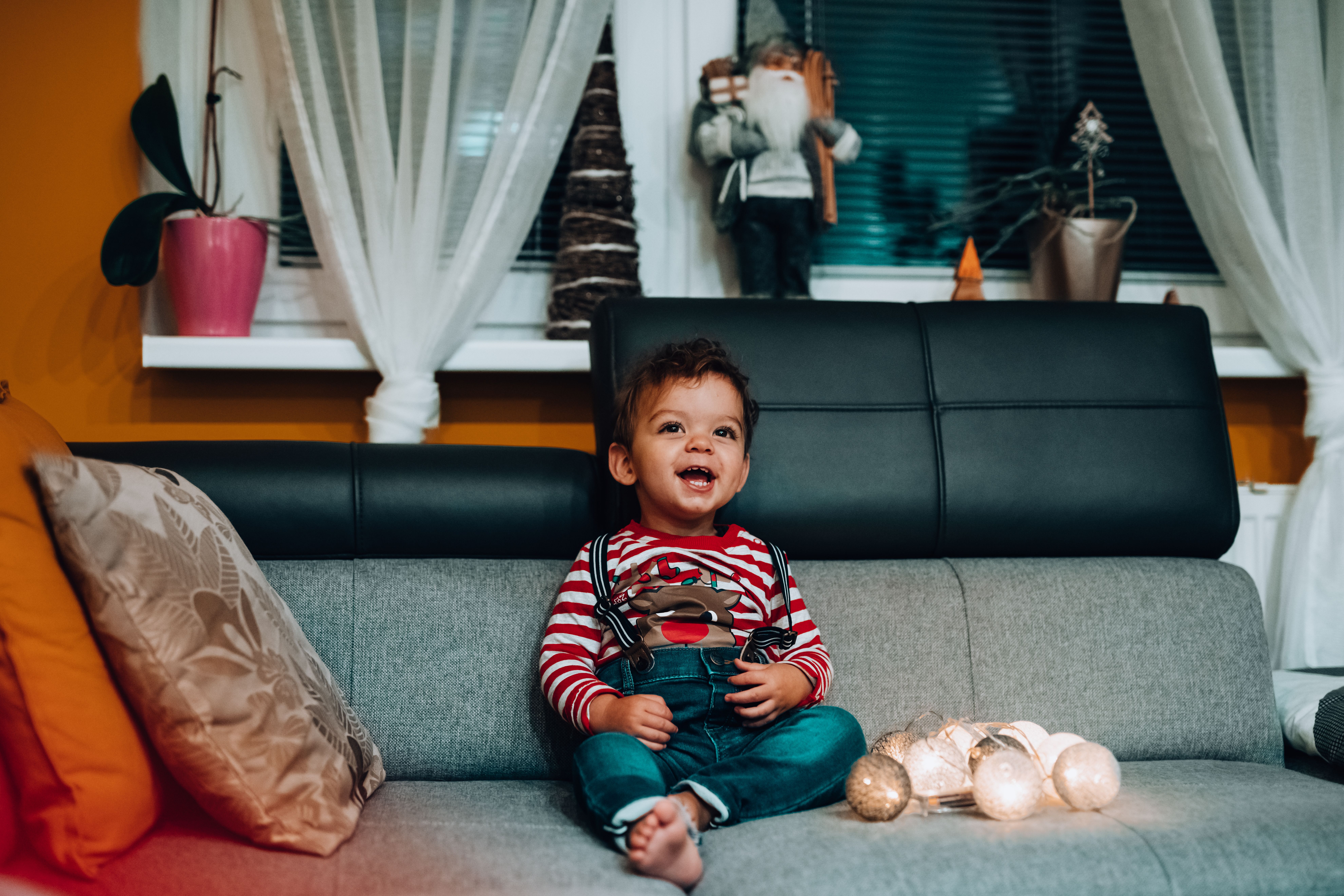 Child Sitting on Sofa · Free Stock Photo