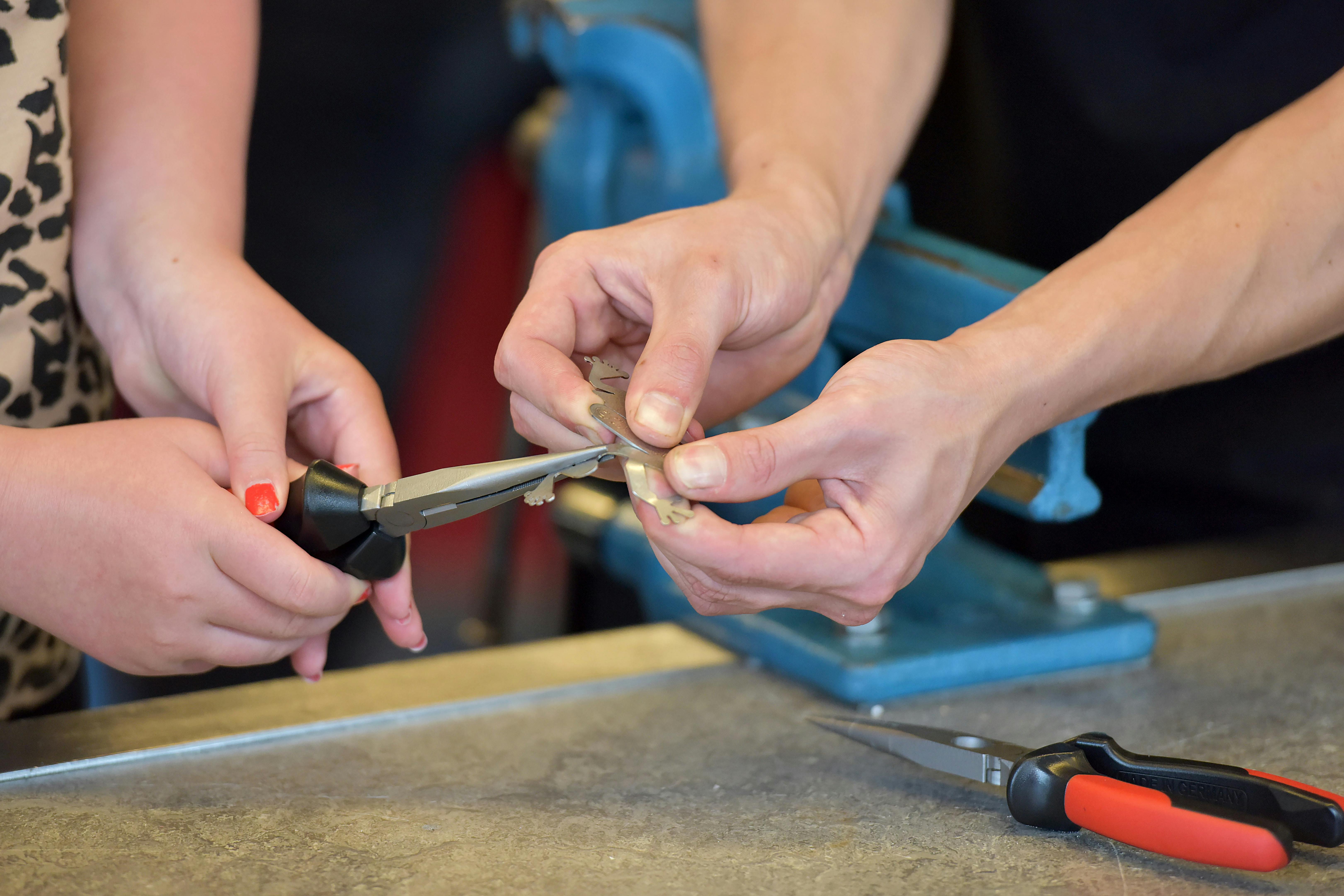 Person Using Pliers · Free Stock Photo