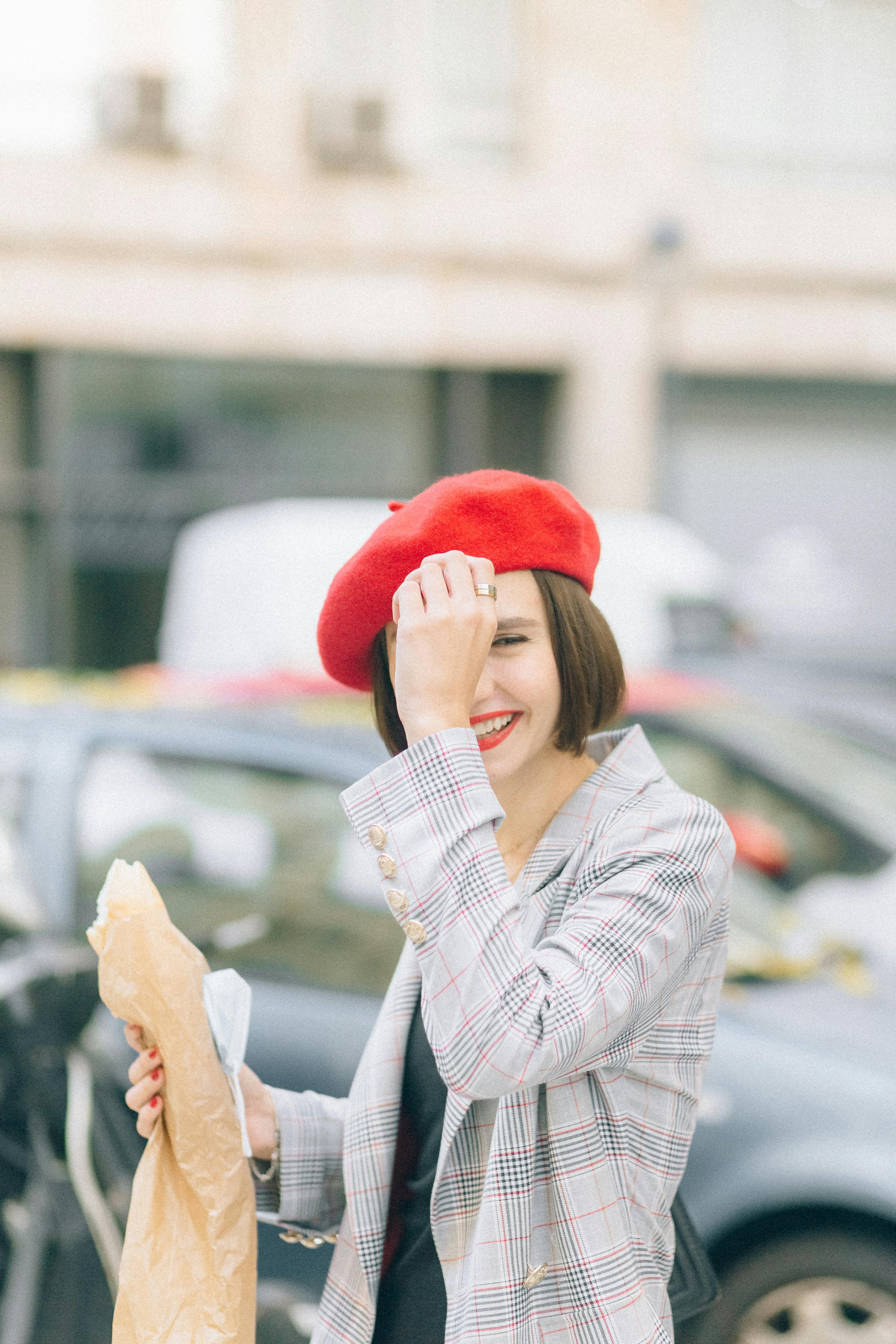 Woman Standing Near Post · Free Stock Photo