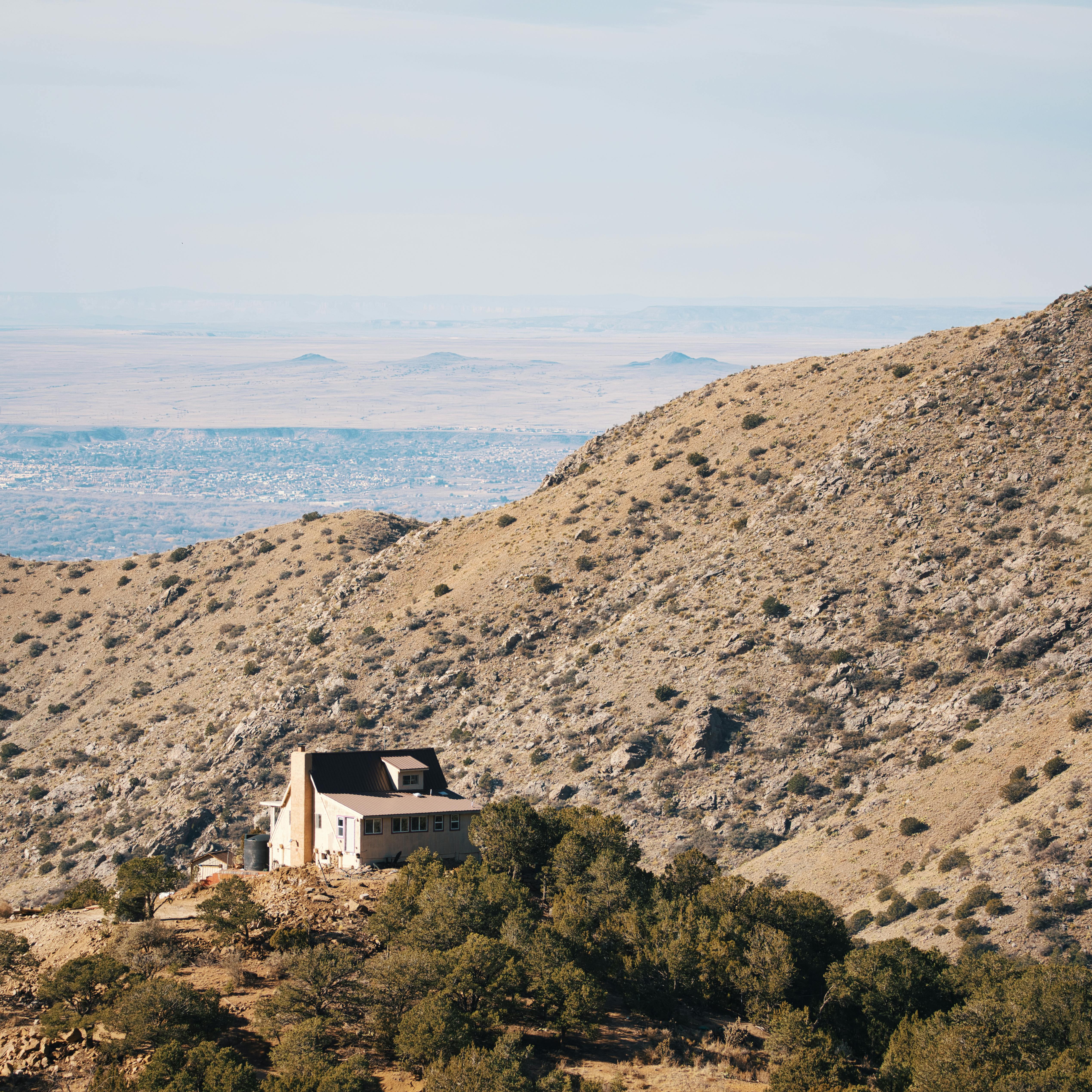 Aerial Photography of a House on Top of Mountain · Free Stock Photo