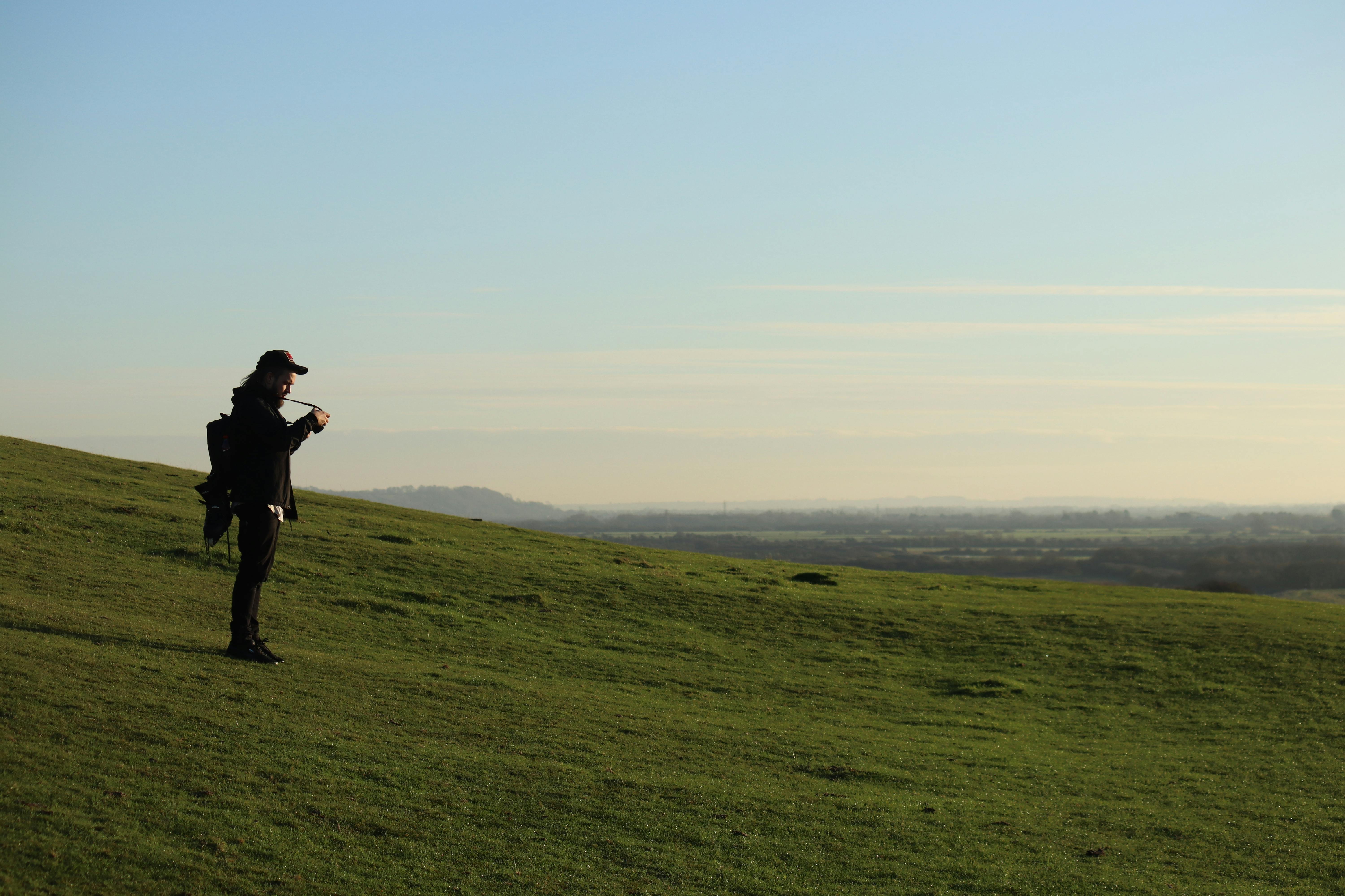 People Photography of Man and Woman Sitting on Green Grass Field · Free ...