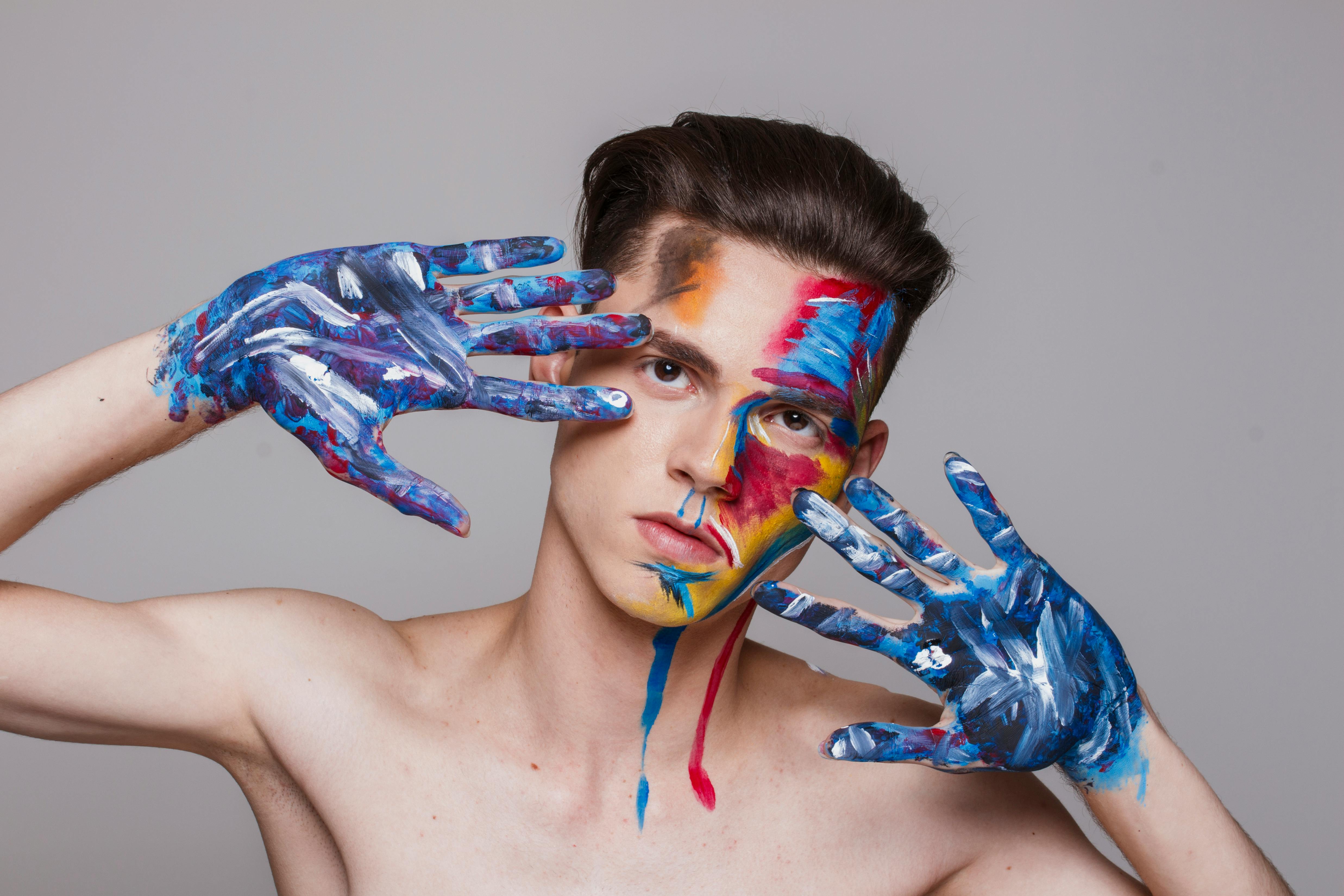 Man With Paint on Face and Hands · Free Stock Photo