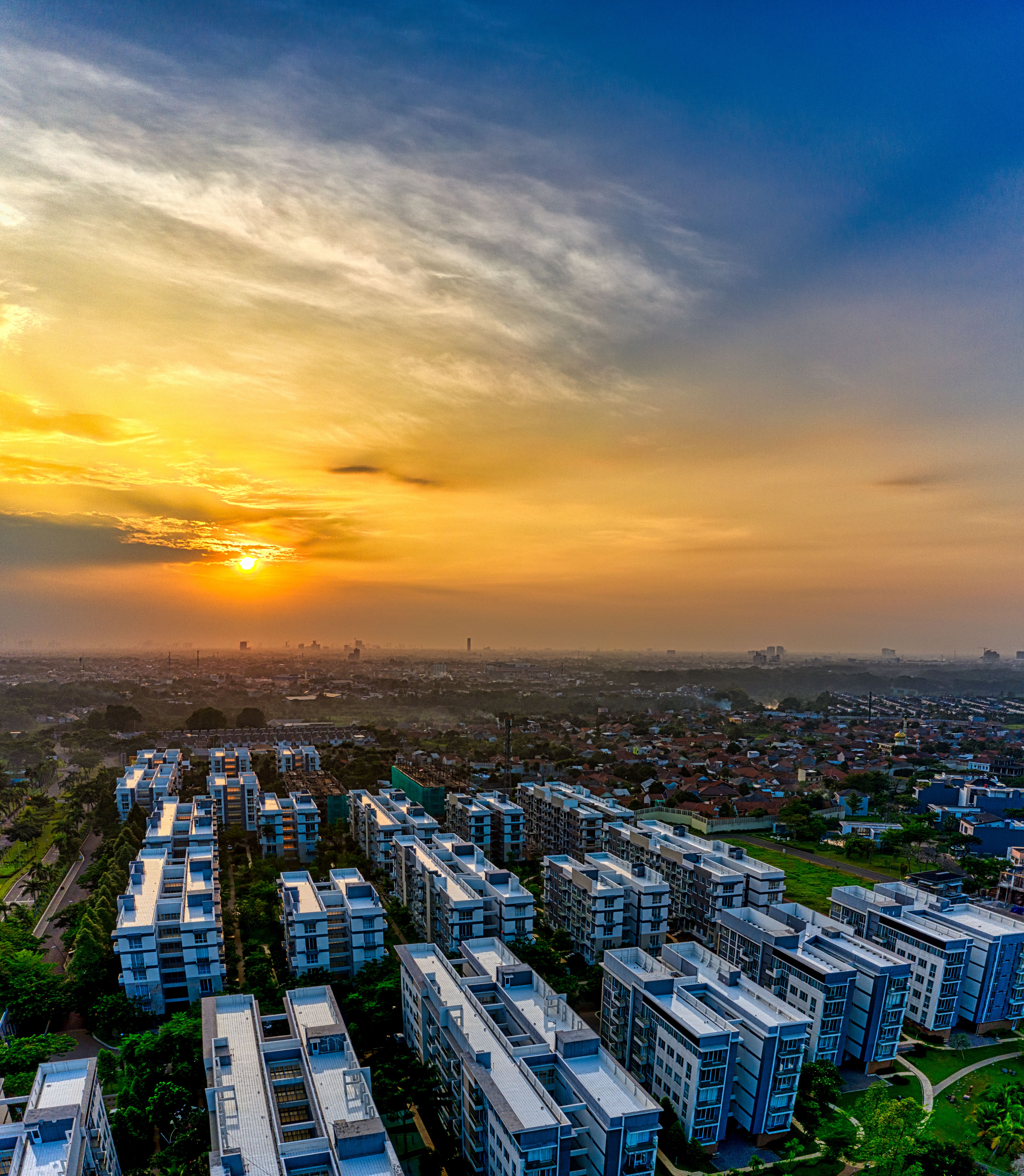 Bright sunlight shining on cloudy sky over residential houses · Free ...