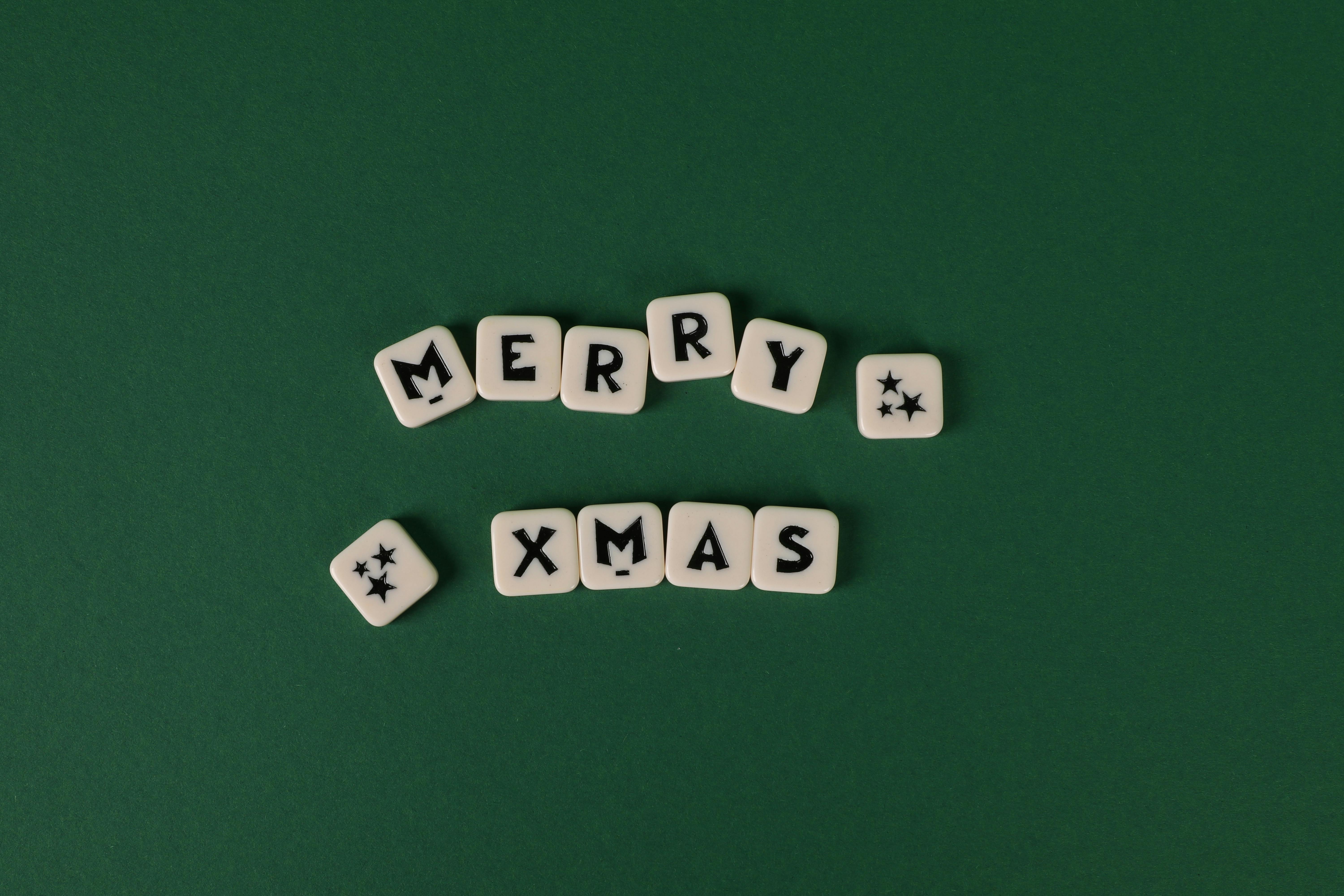 White and Black Scrabble Tiles On Green Background · Free Stock Photo