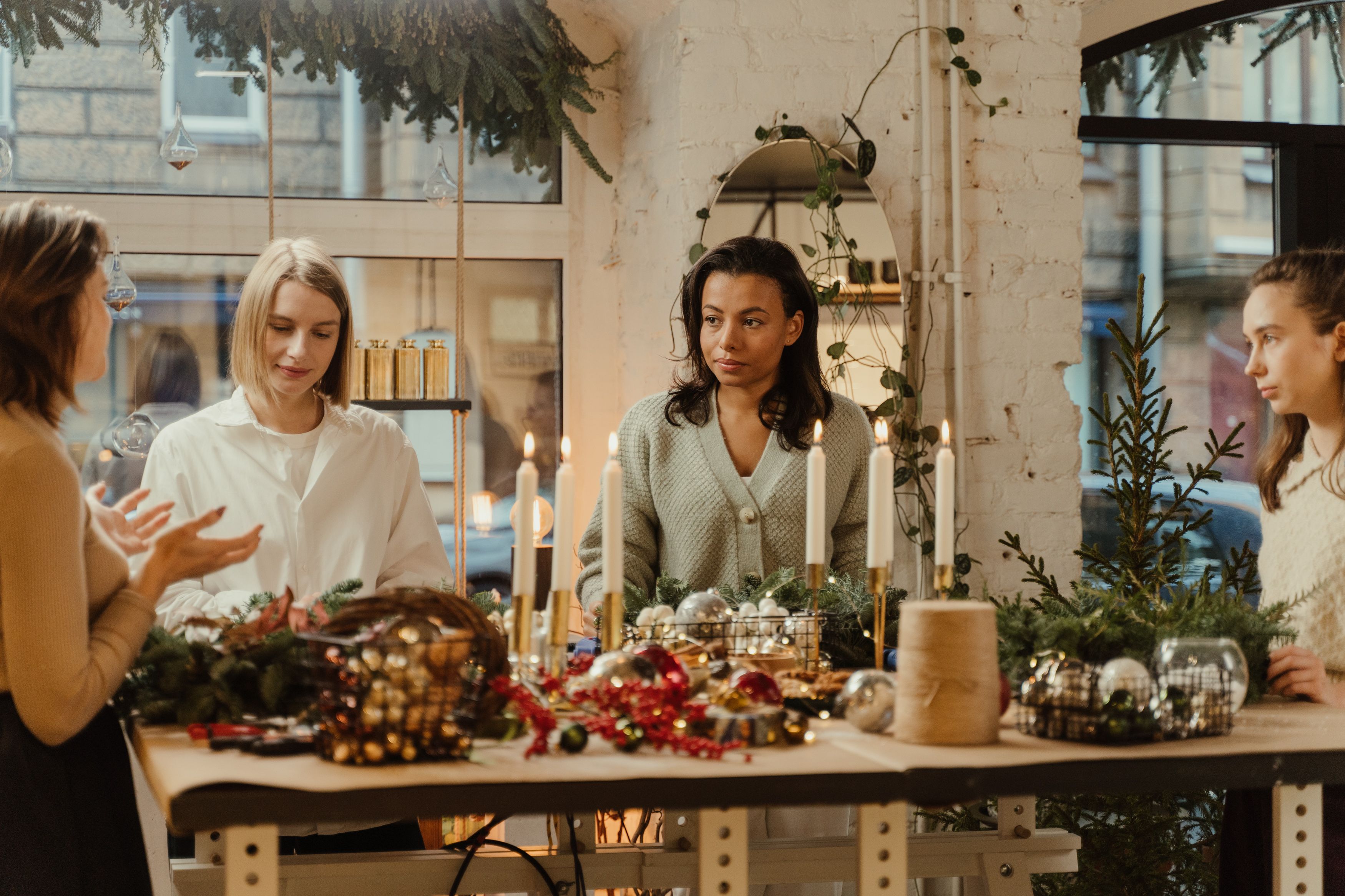 A Woman Standing at the Table · Free Stock Photo