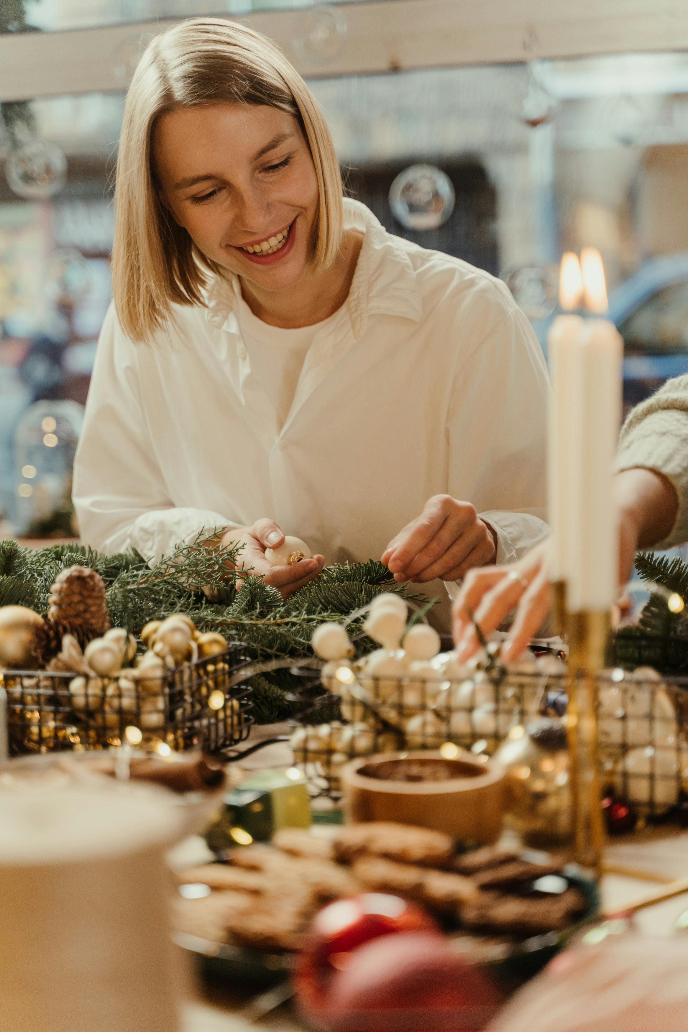 A Woman Standing at the Table · Free Stock Photo