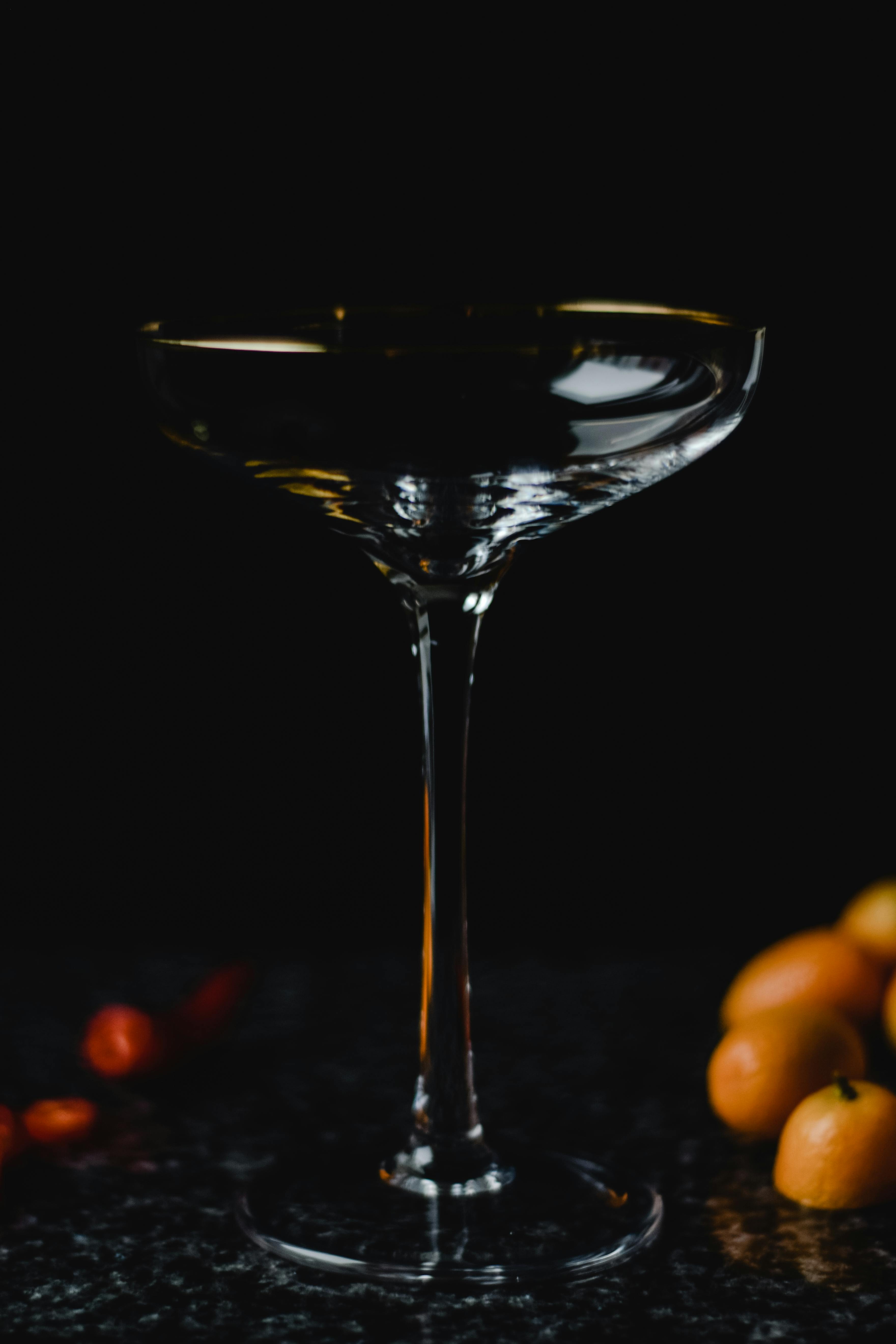 Coupe Cocktail Glass On Black Background · Free Stock Photo