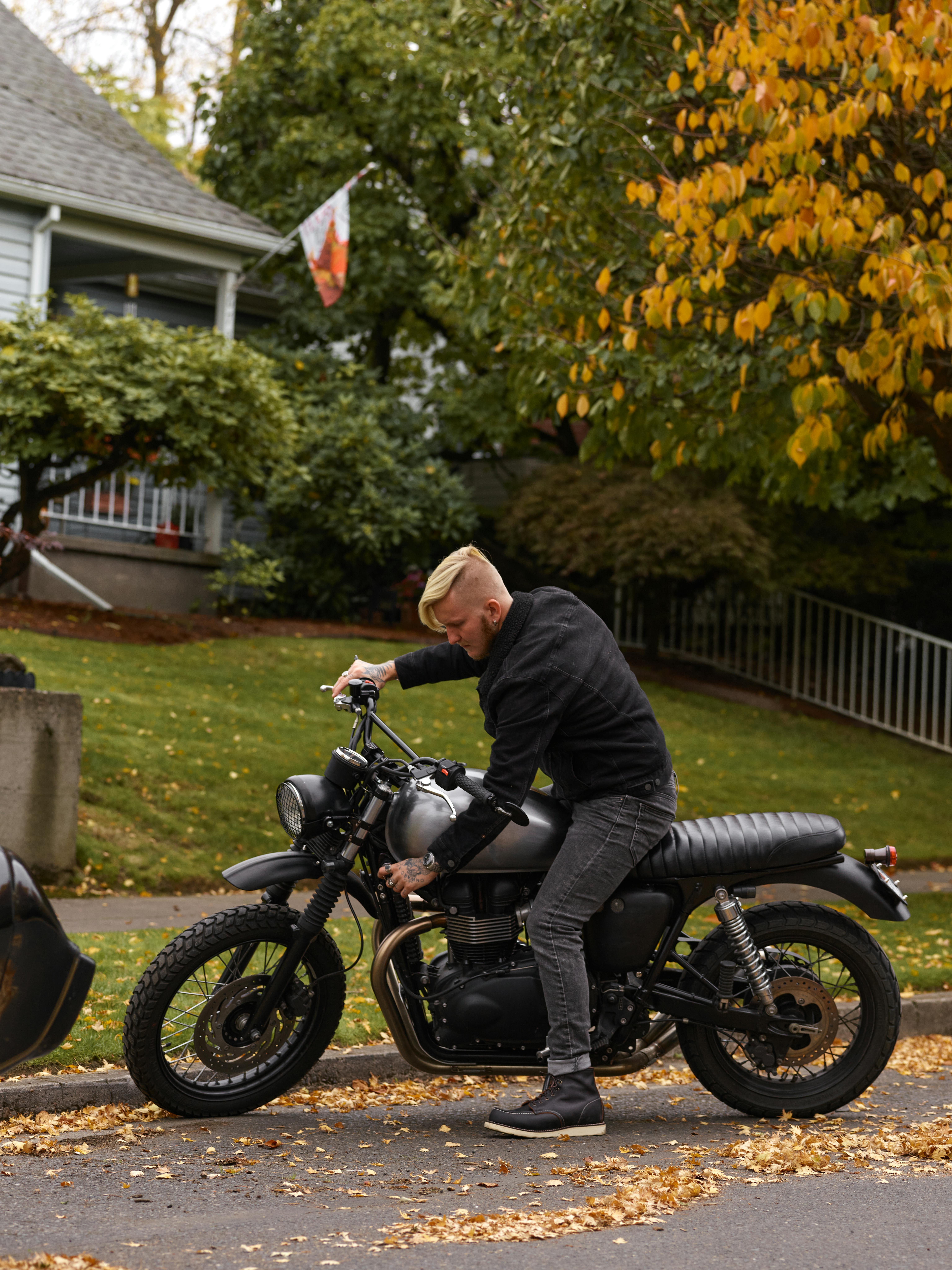 A Man Riding a Motorcycle · Free Stock Photo