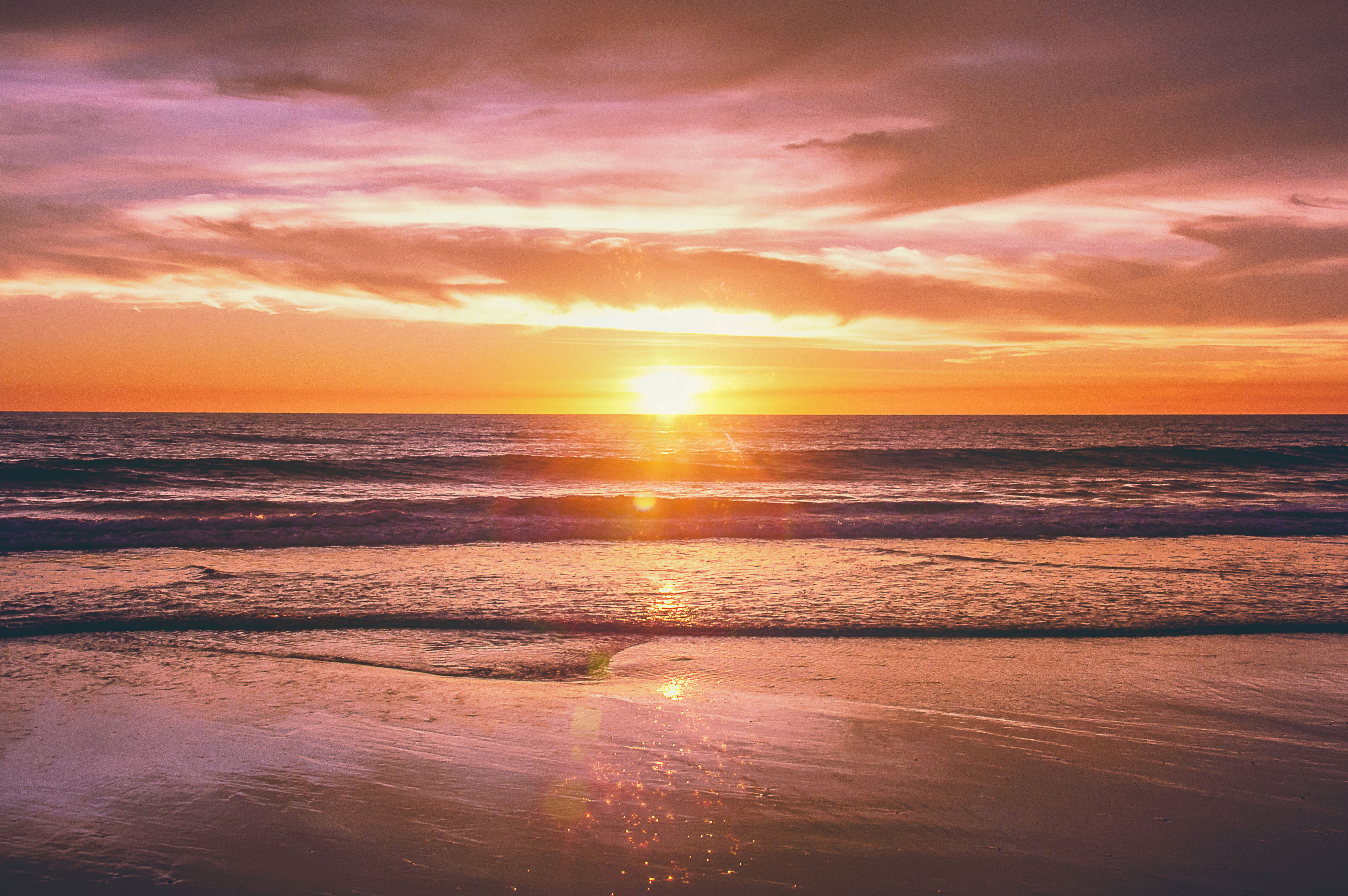 Sea Waves Crashing on Shore during Sunset · Free Stock Photo
