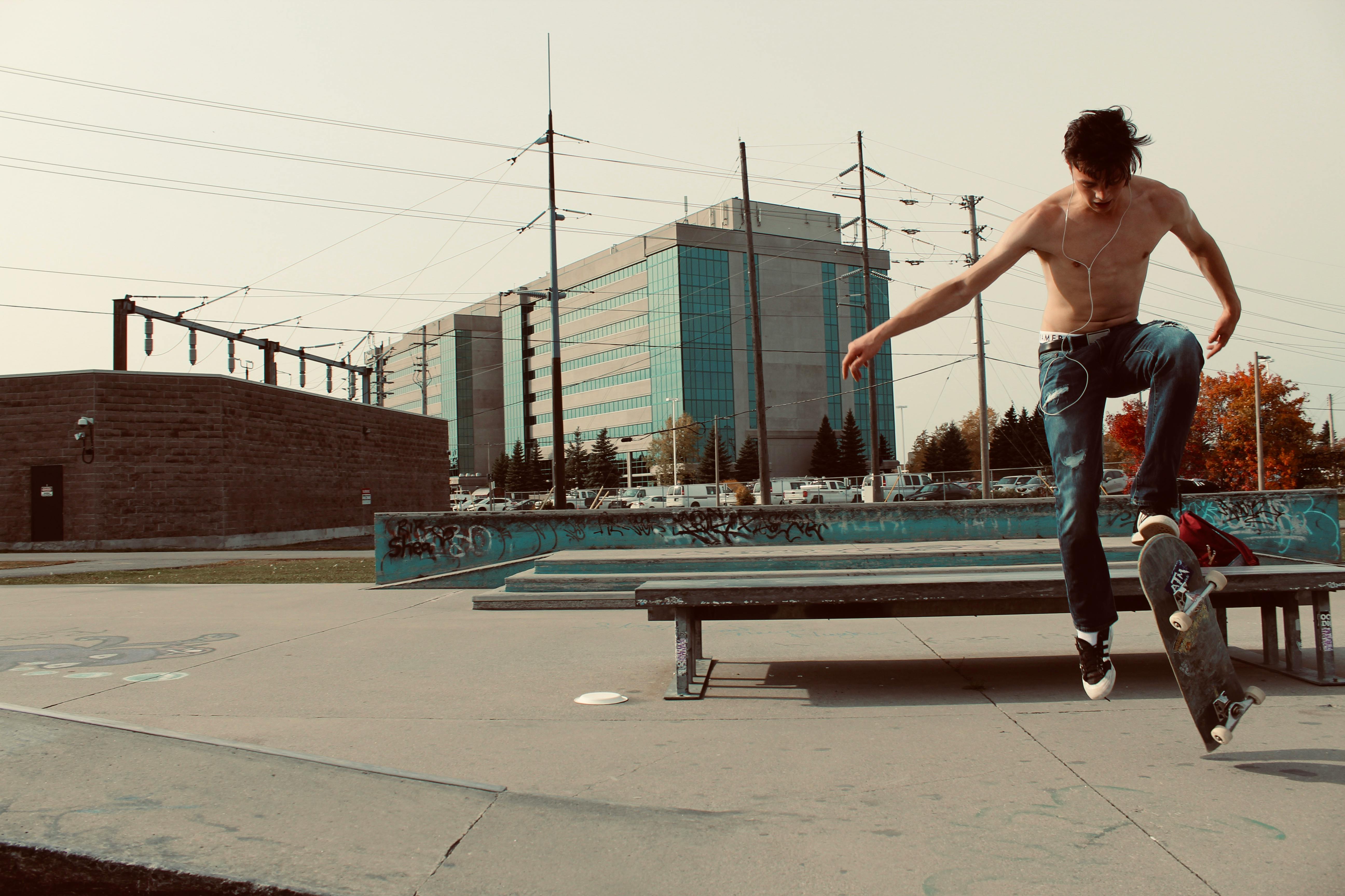 Shirtless Man Skateboarding · Free Stock Photo
