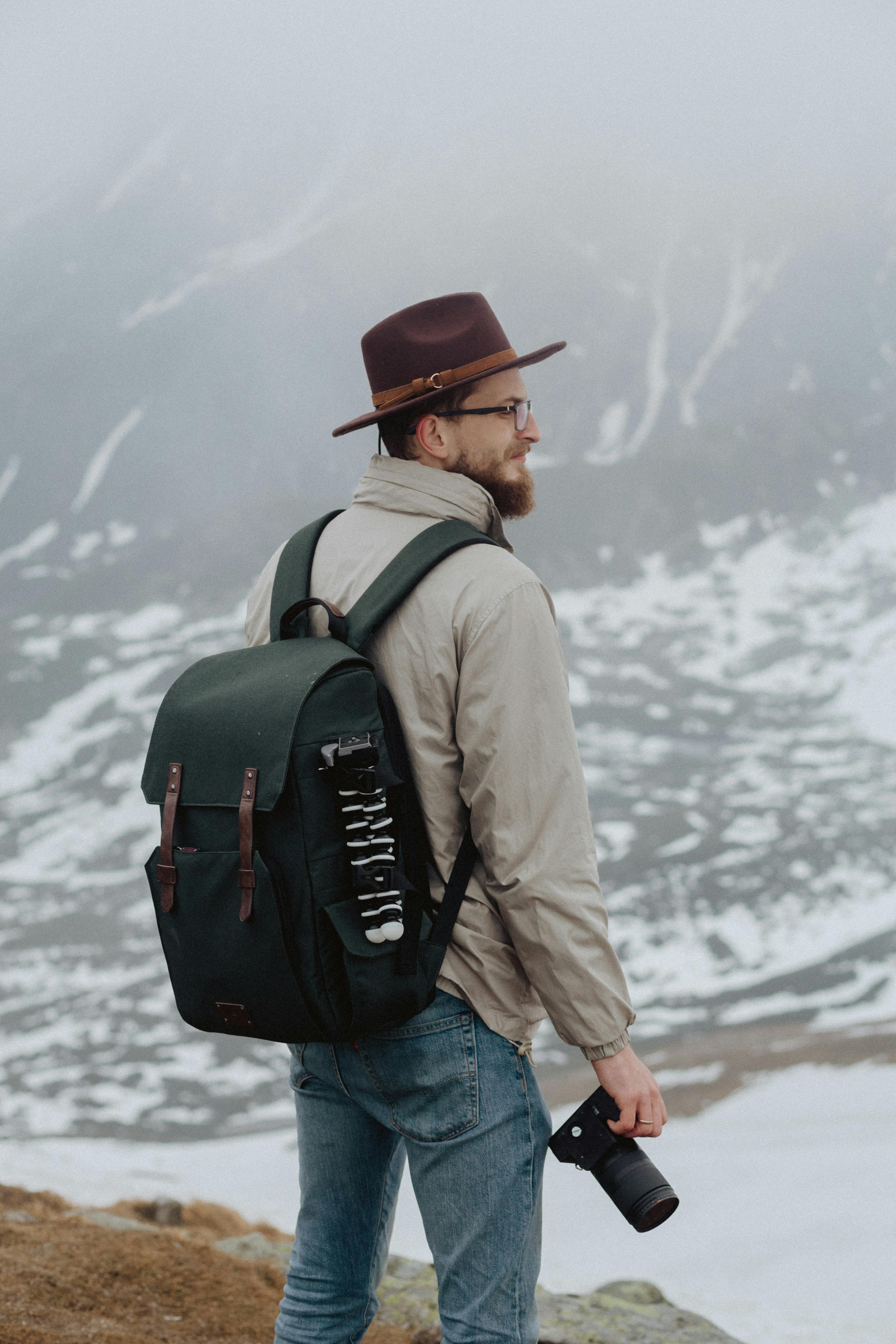 Man with Camera and Backpack · Free Stock Photo