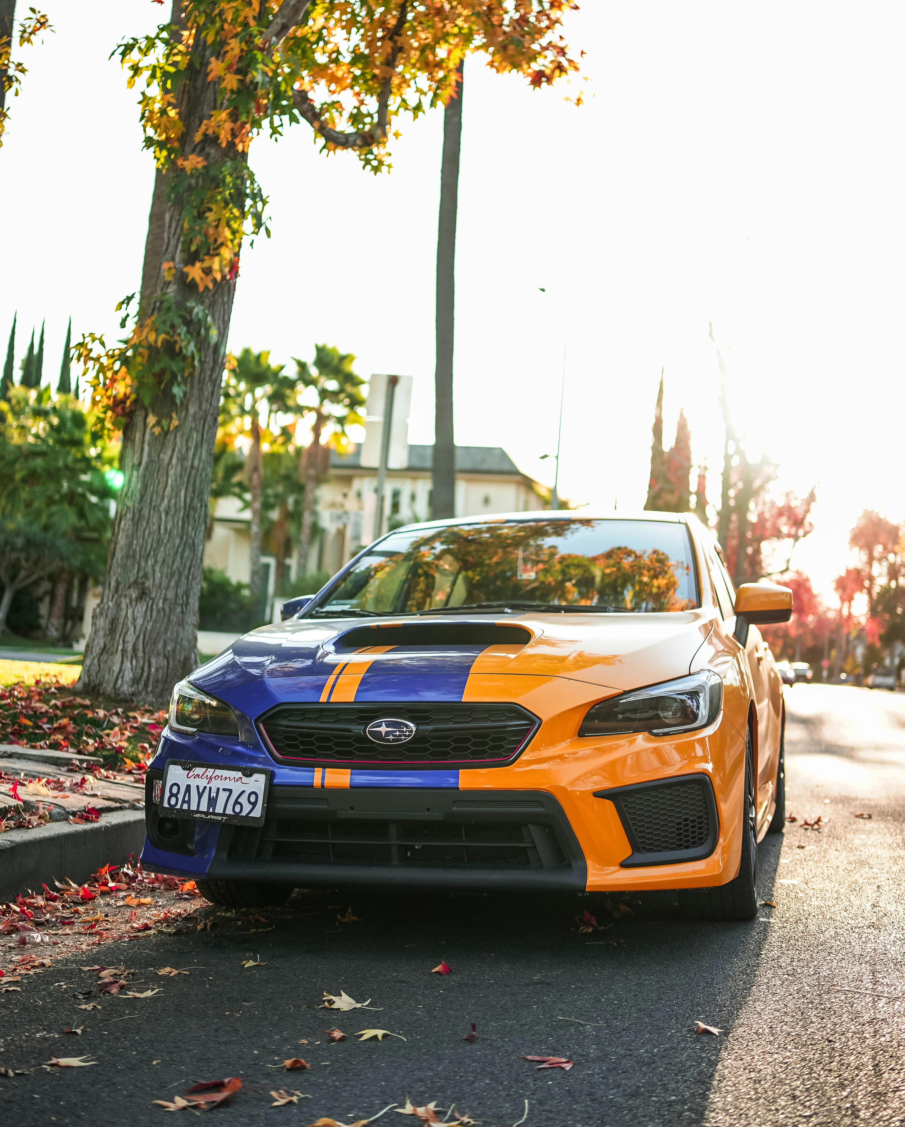 White Car Parked on the Side of the Street · Free Stock Photo