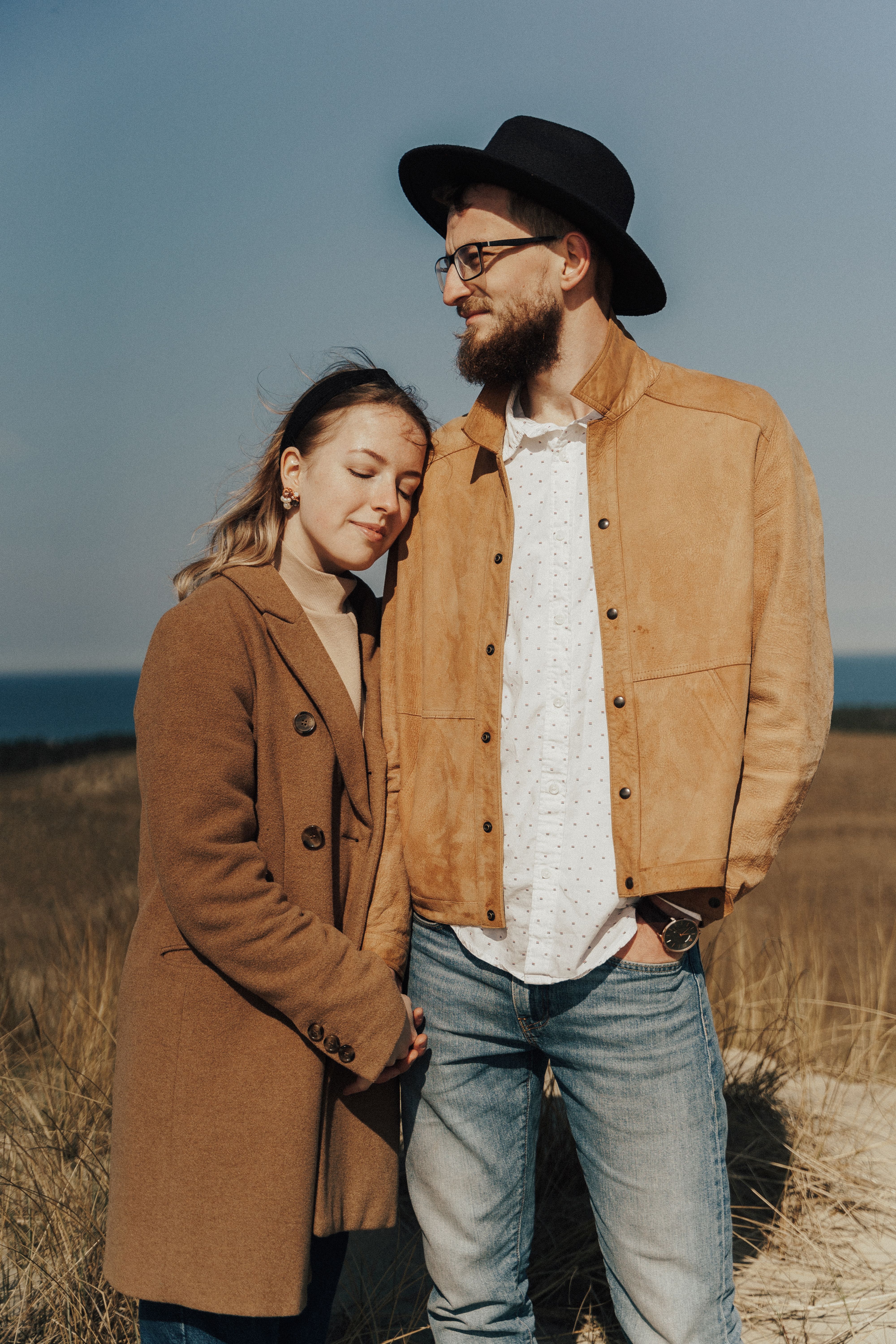 A Couple Wearing Brown Coat · Free Stock Photo