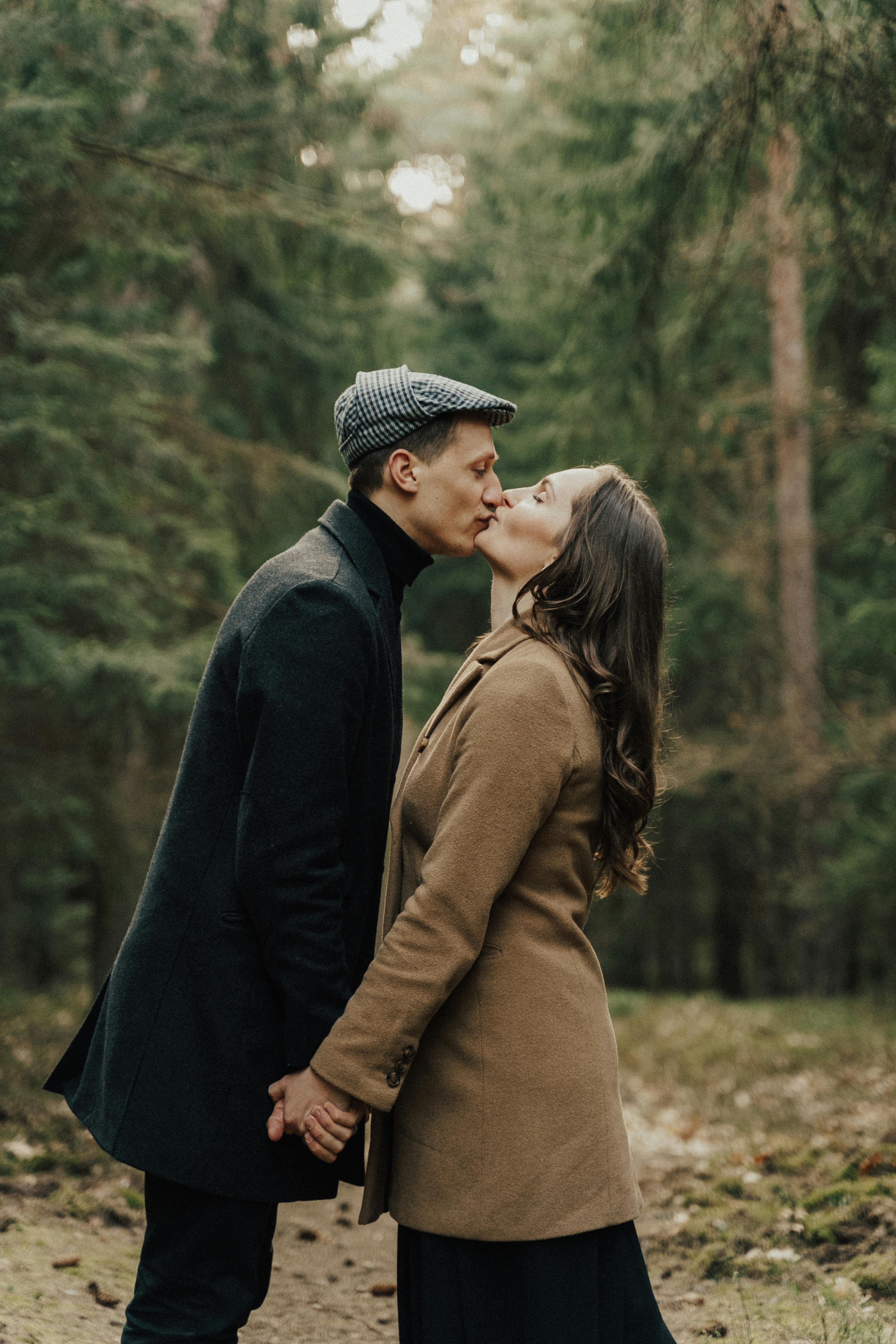 Woman's Right Hand on Top of Man's Right Hand · Free Stock Photo