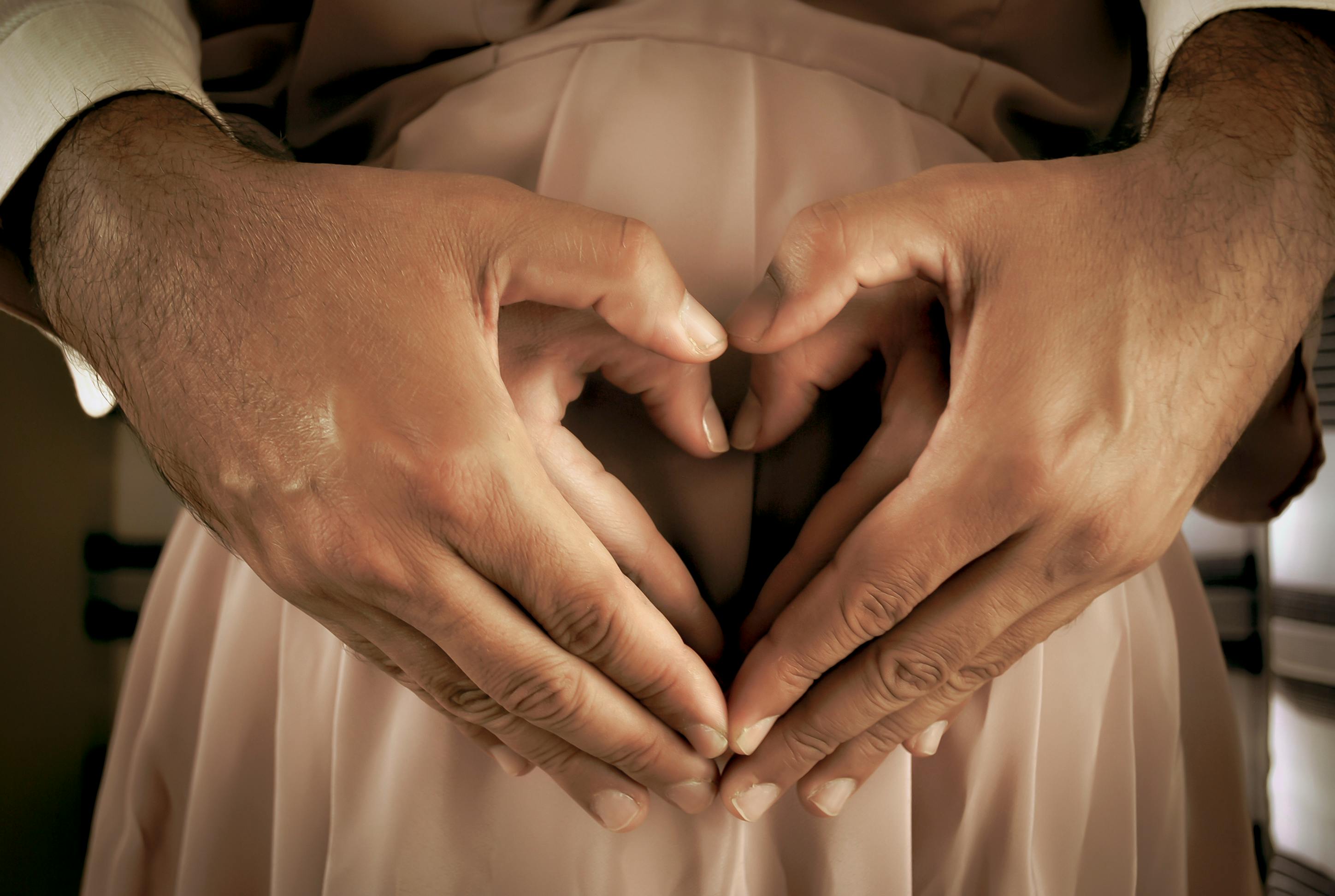 Couple Making Heart Shape using Hands · Free Stock Photo