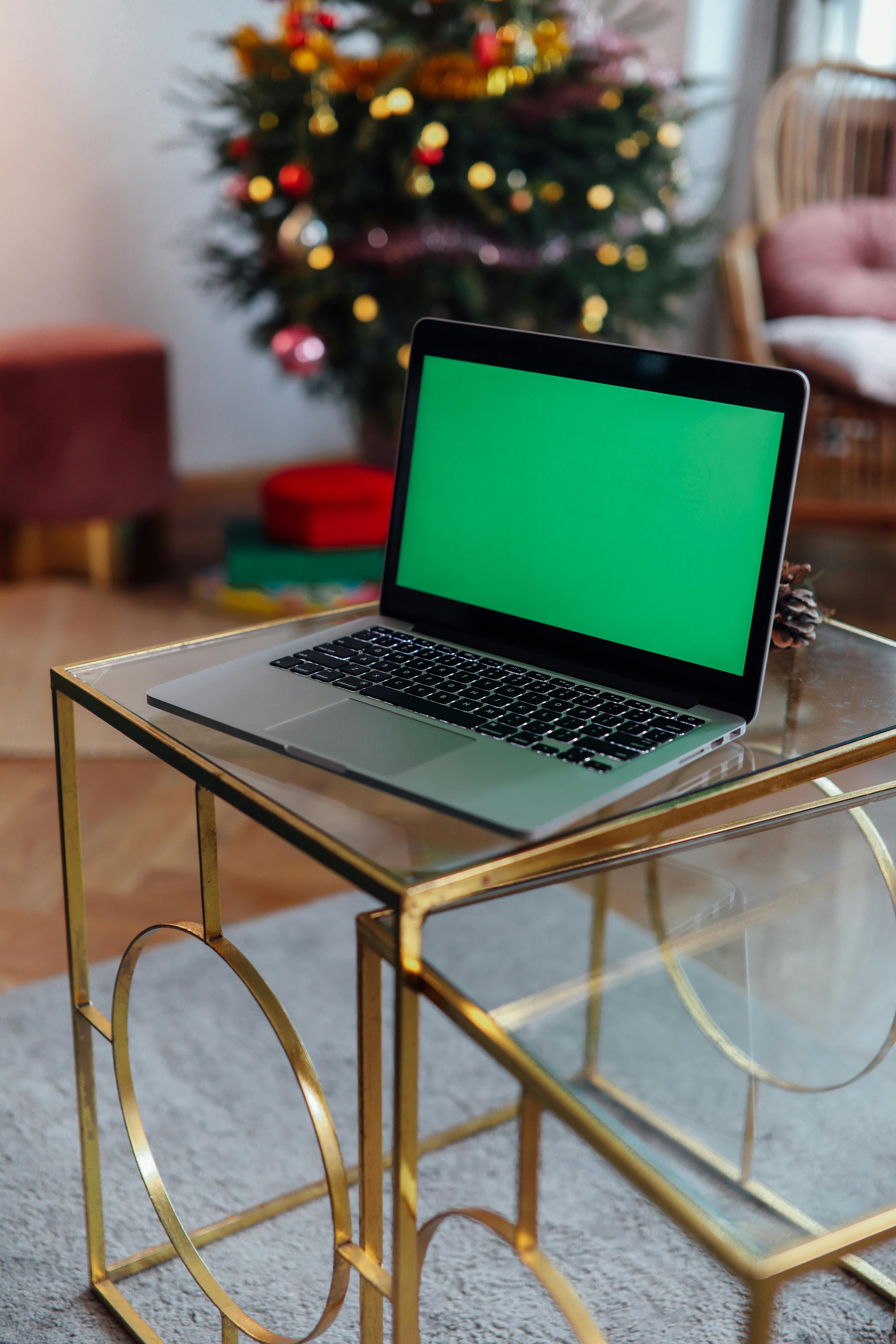 Macbook Pro on Glass Table · Free Stock Photo