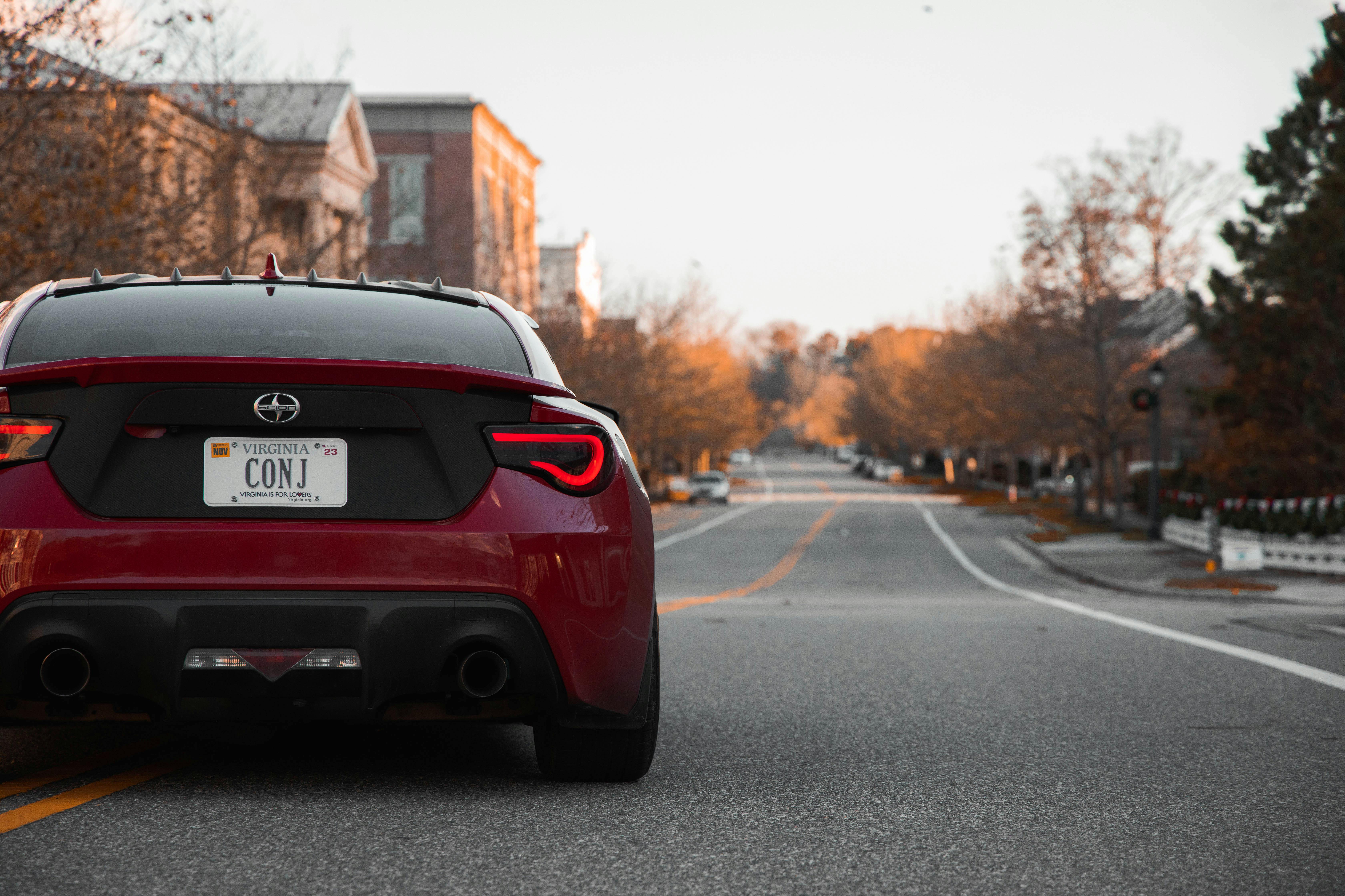 Red Car on Road · Free Stock Photo