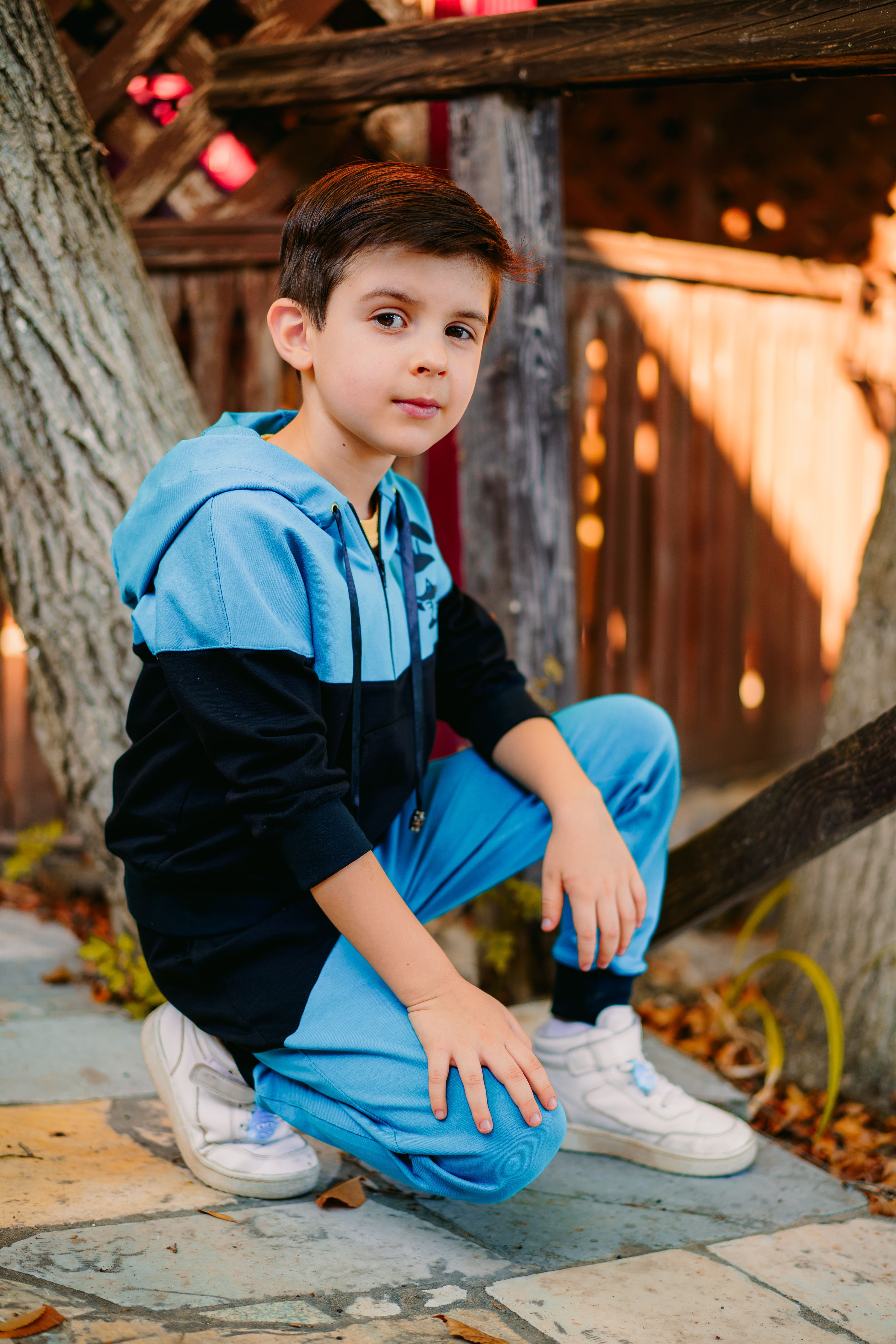 A Boy in Blue Hoodie Jacket and Blue Jogging Pants · Free Stock Photo