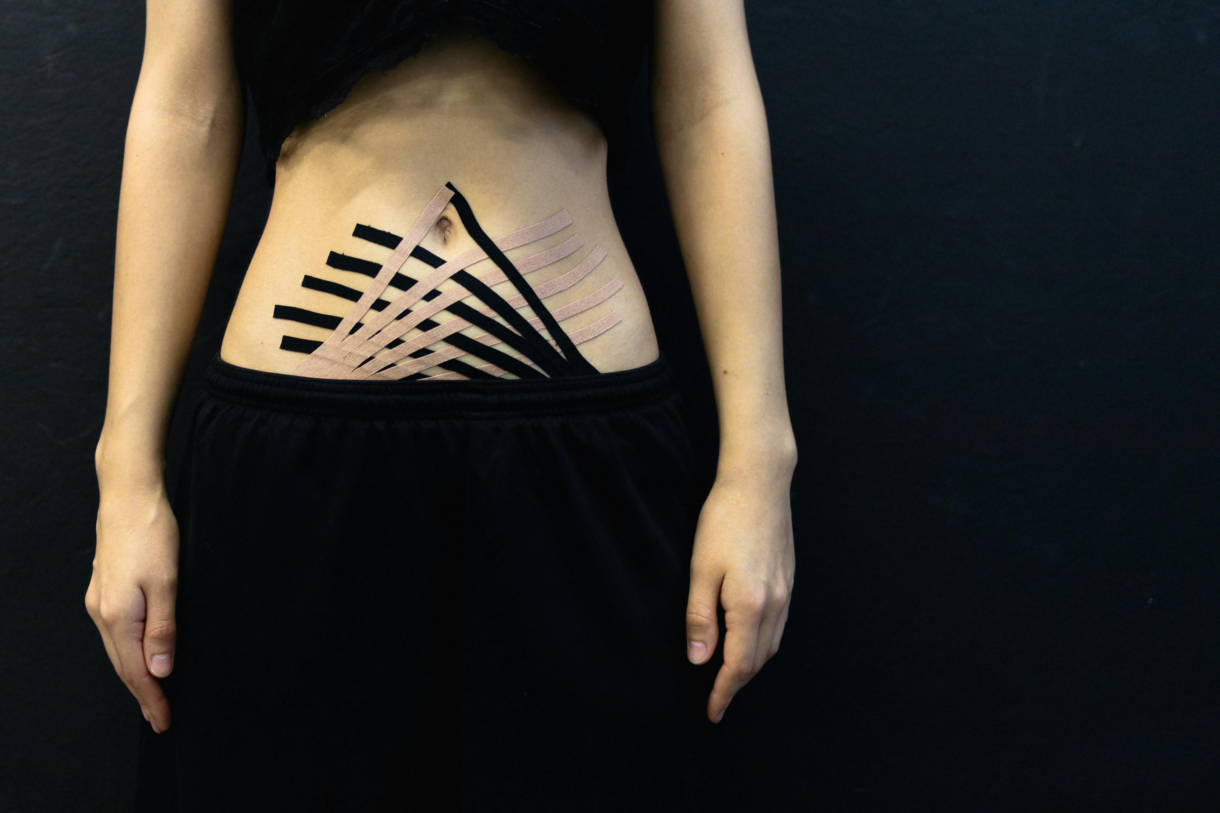 A Woman Hands on Her Belly · Free Stock Photo