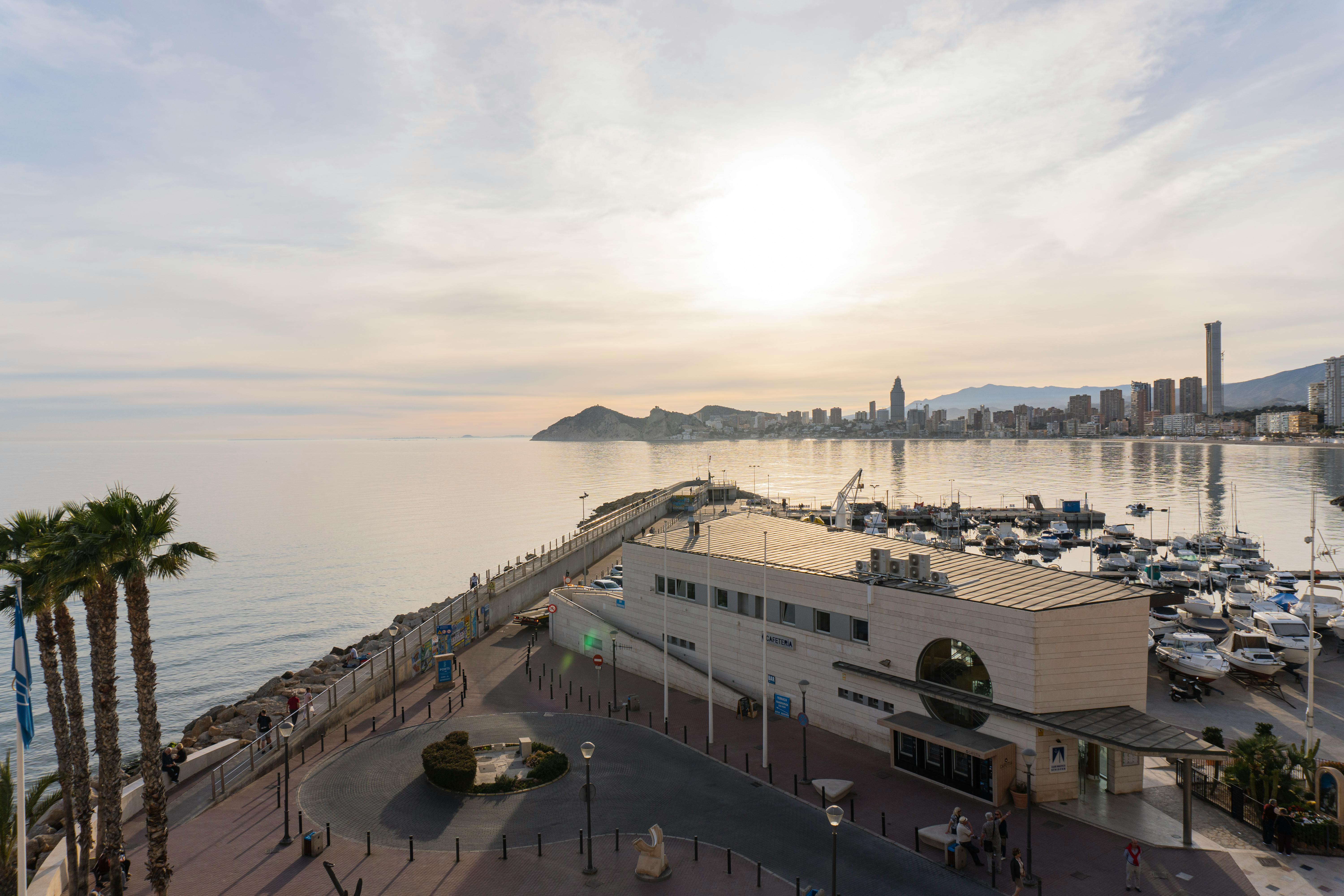 A Scenic View of the Sunset at the Port of Benidorm · Free Stock Photo