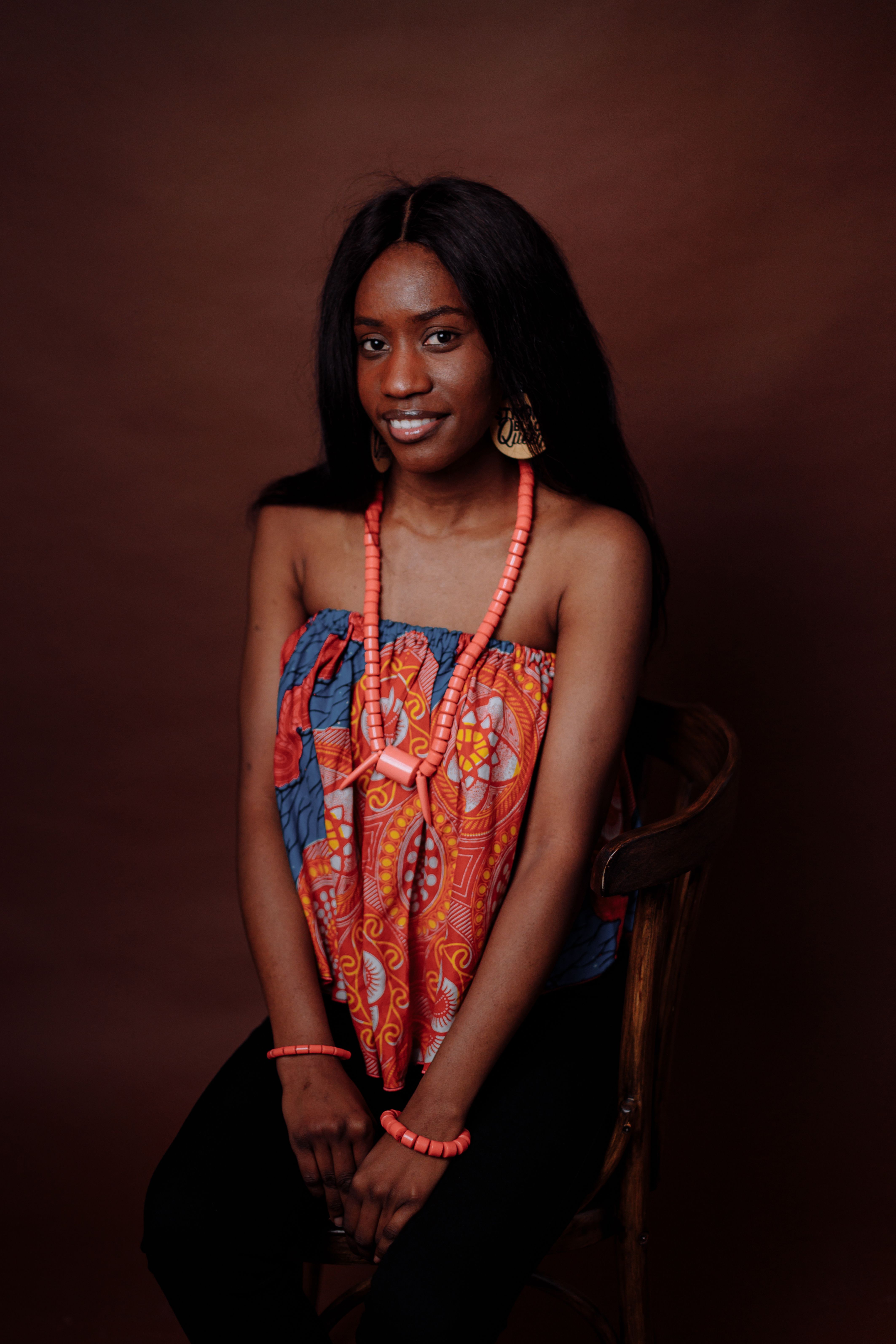 A Woman Wearing a Tube Top and Accessories · Free Stock Photo