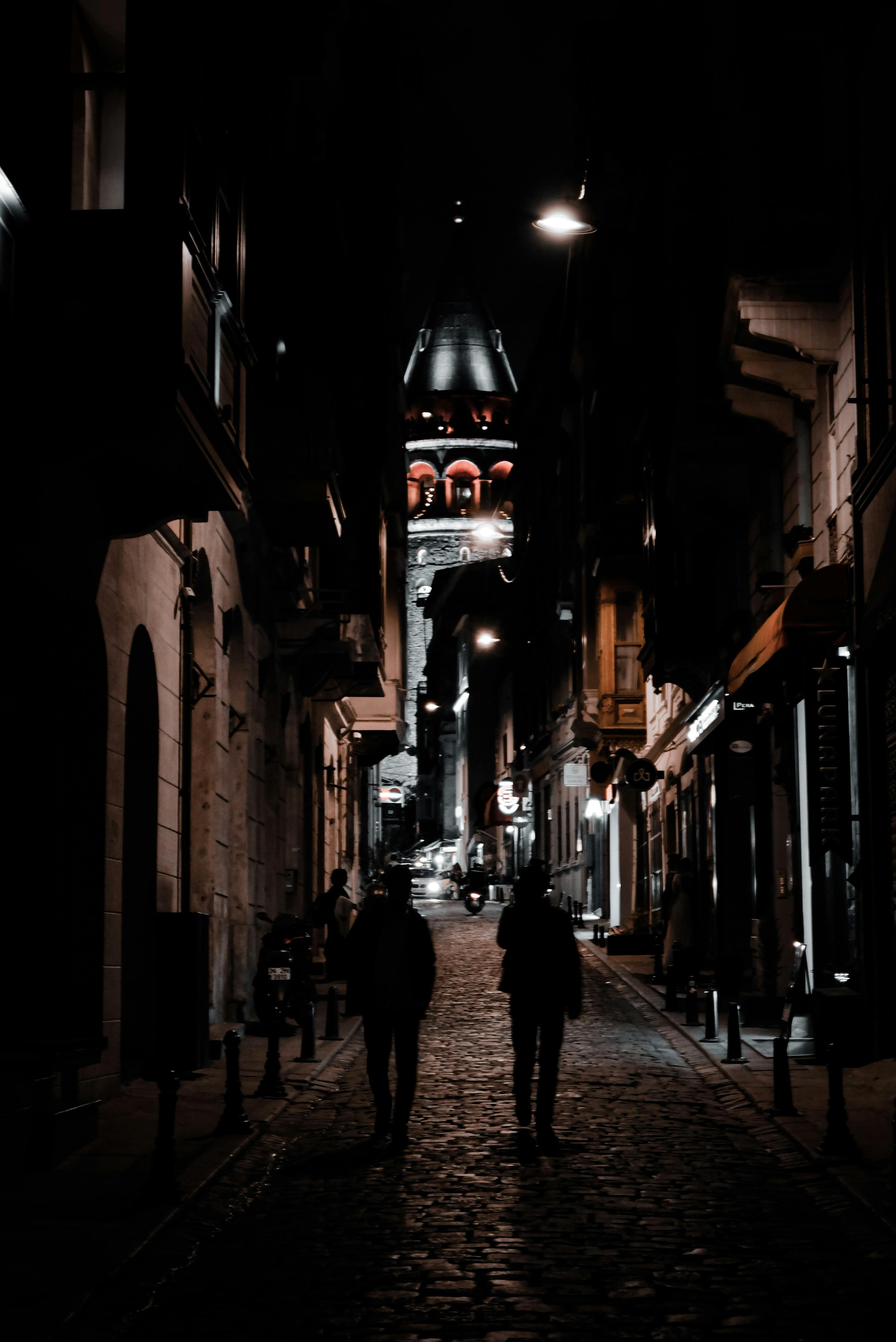 Alley Beside a Building with String Lights · Free Stock Photo