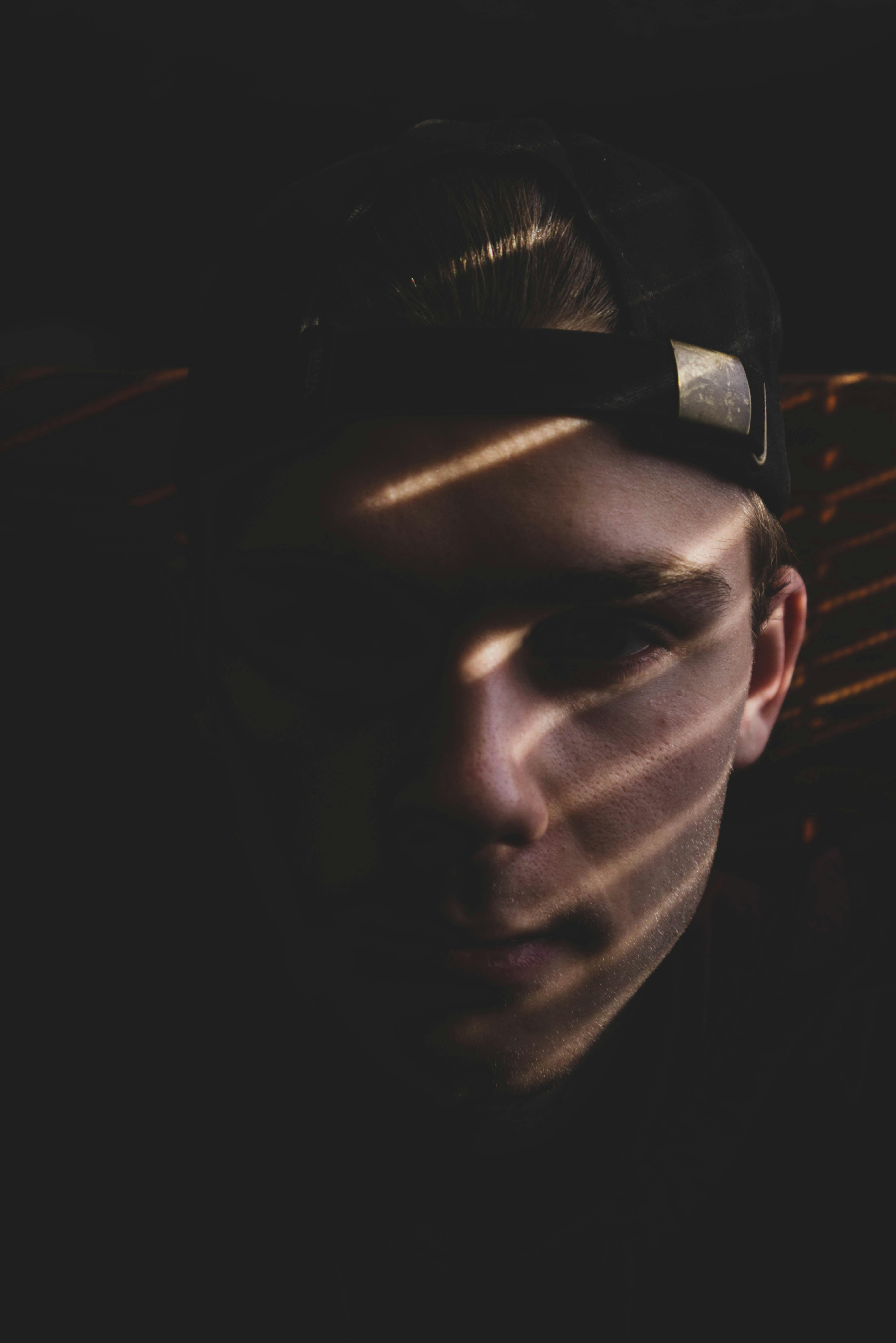 Woman Face in Light and Shadow in Dark · Free Stock Photo