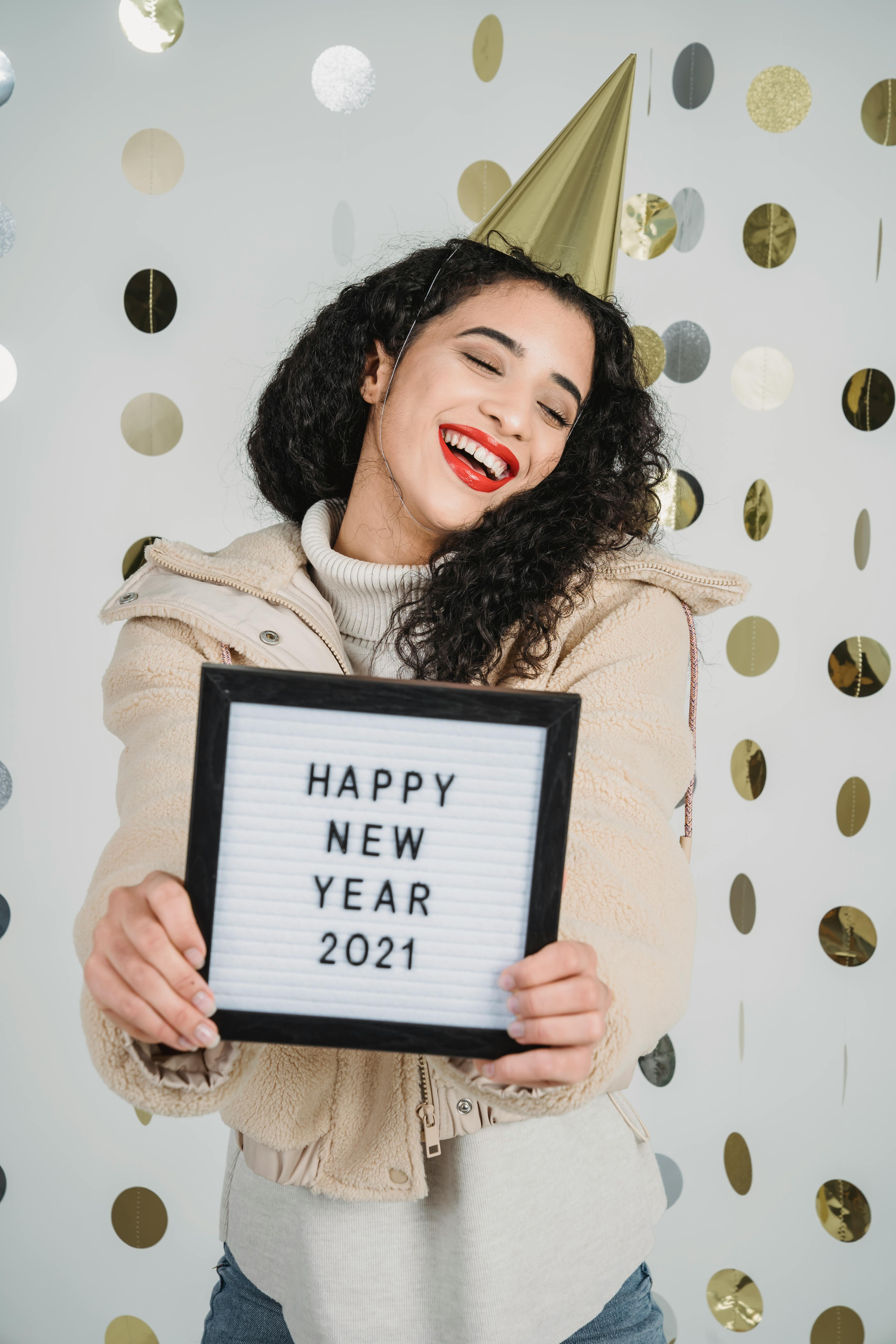 Laughing females enjoying New Year celebration · Free Stock Photo