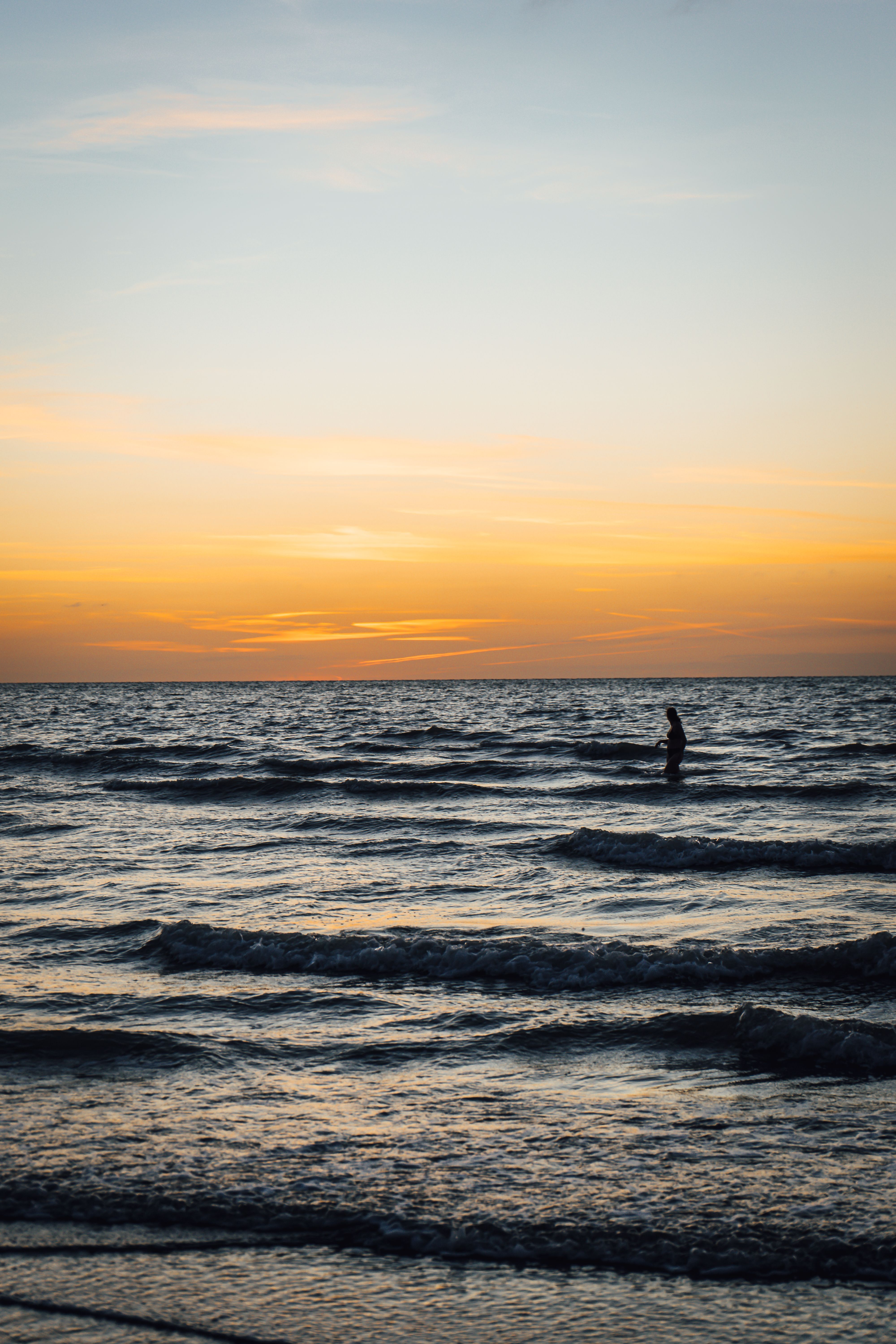 A Person Standing on the Sea · Free Stock Photo