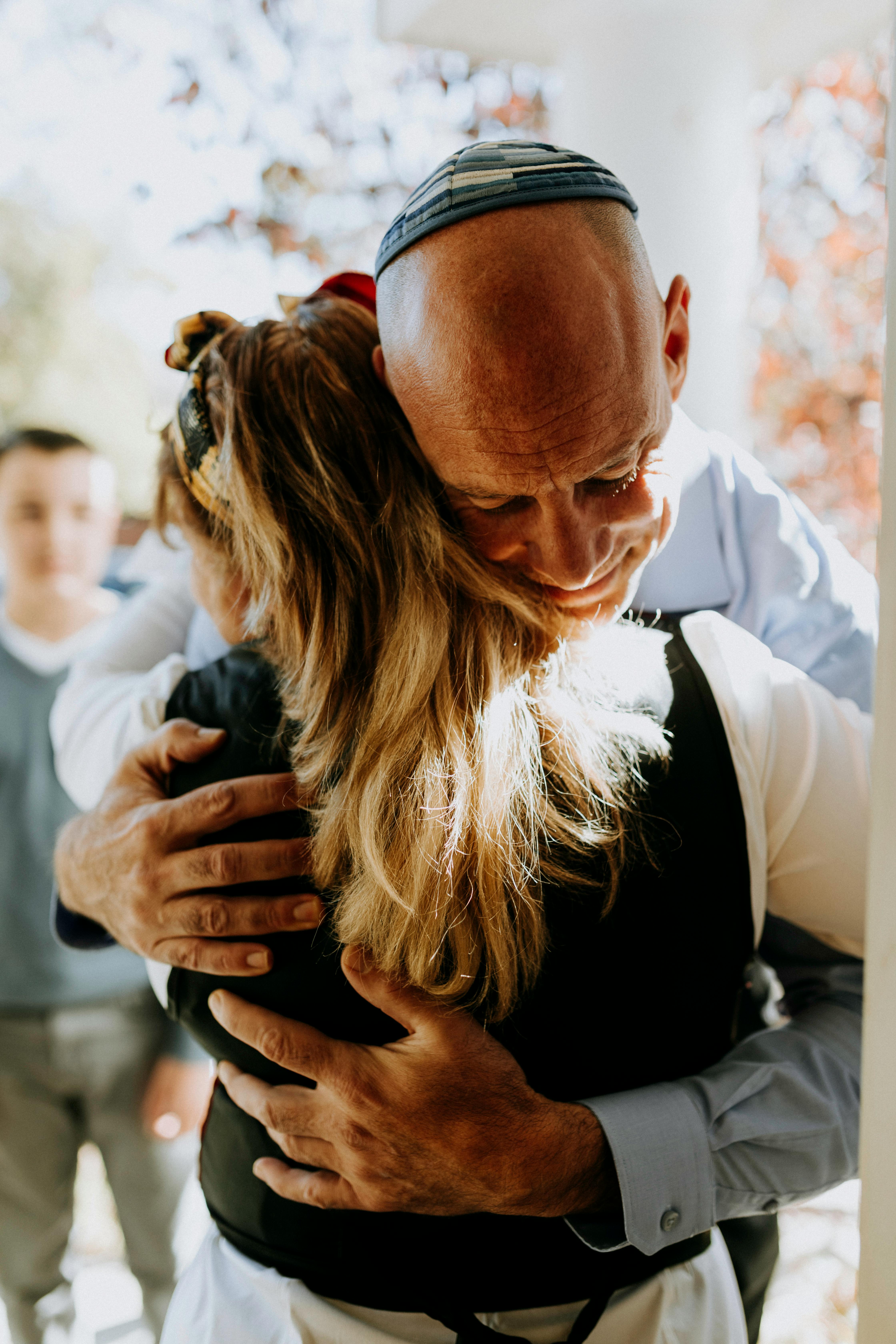 Photo Of Man Hugging Woman · Free Stock Photo