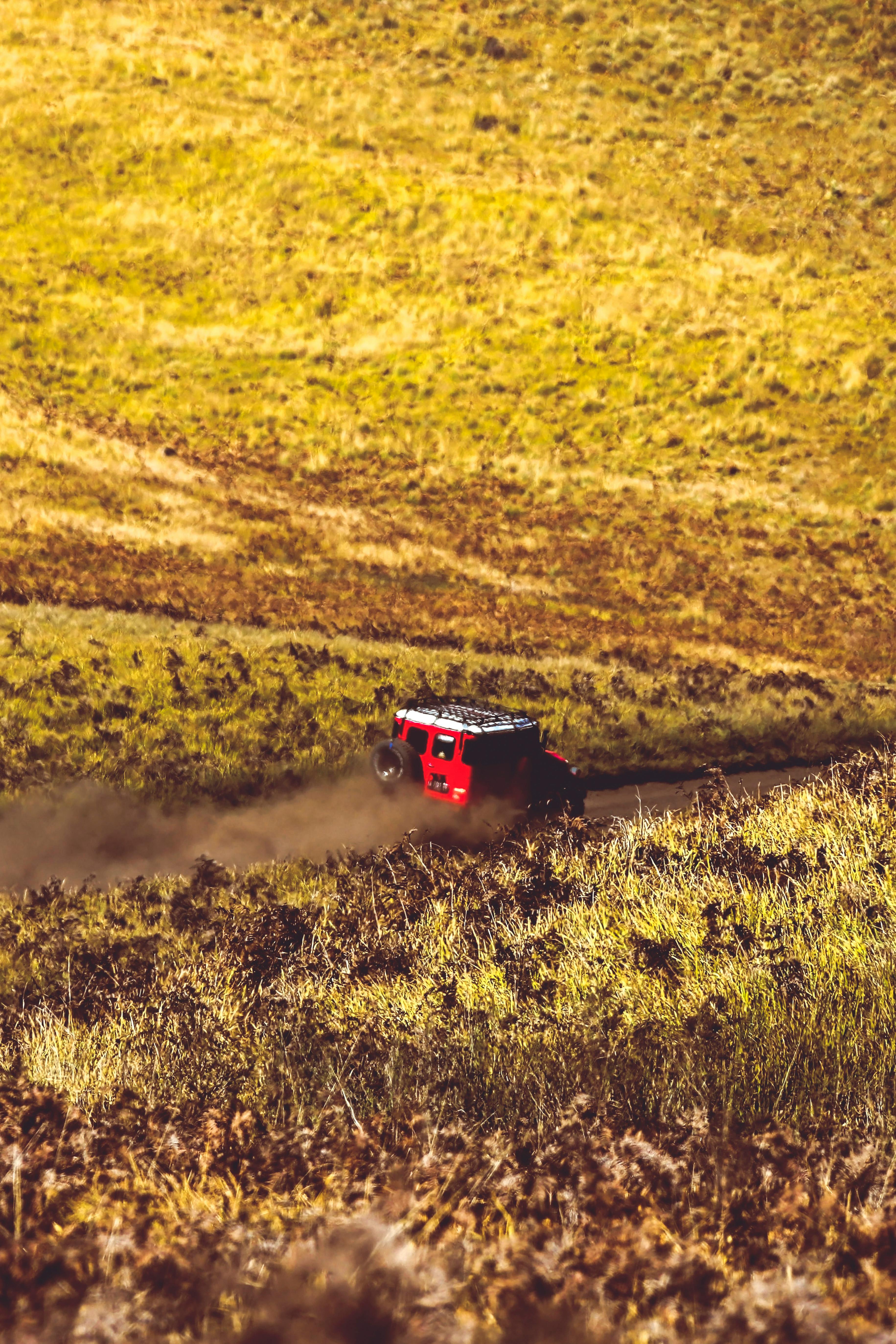 A Red Land Cruiser Traveling ah Off Road · Free Stock Photo