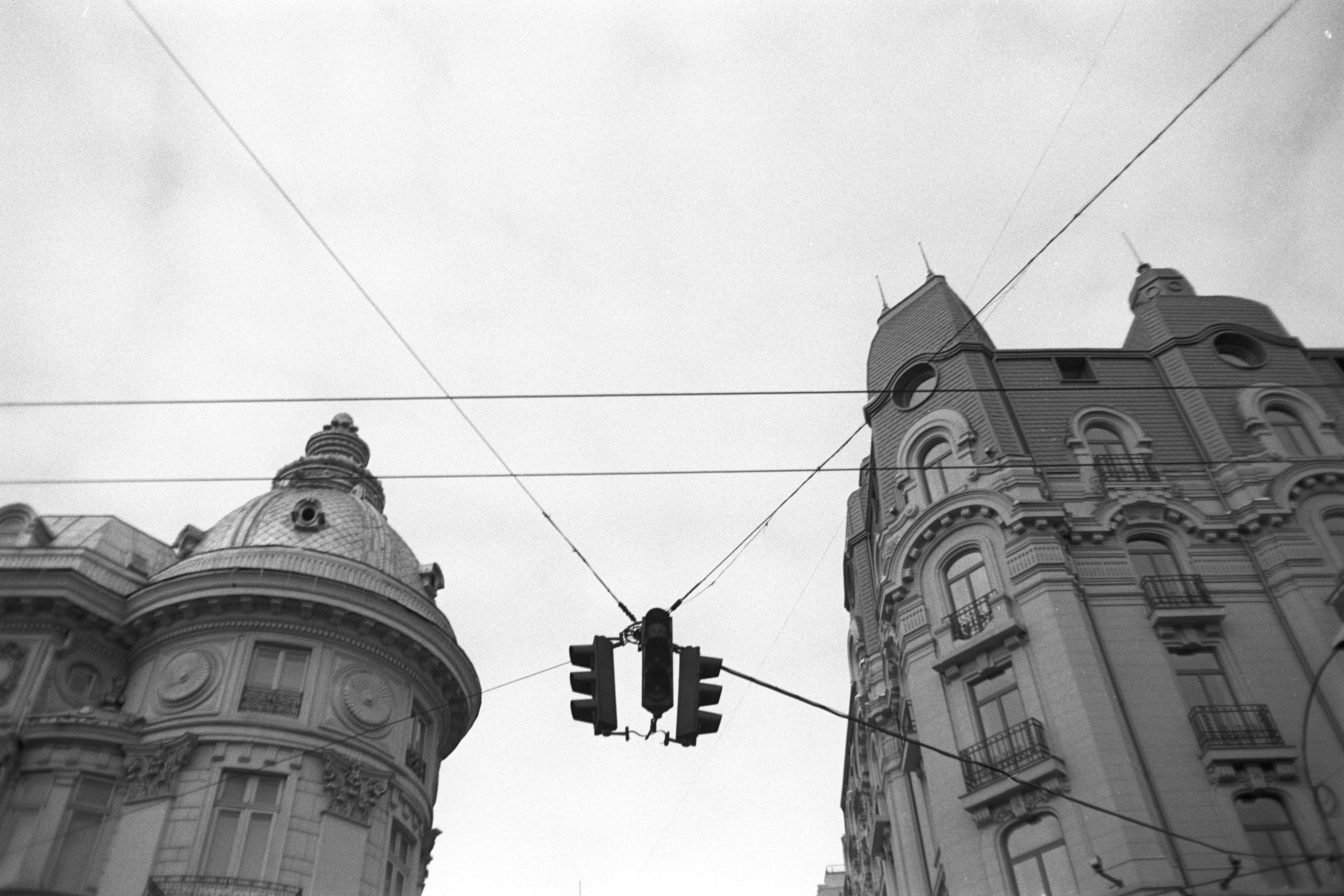 Traffic Lights Hanging on Wire Ropes · Free Stock Photo