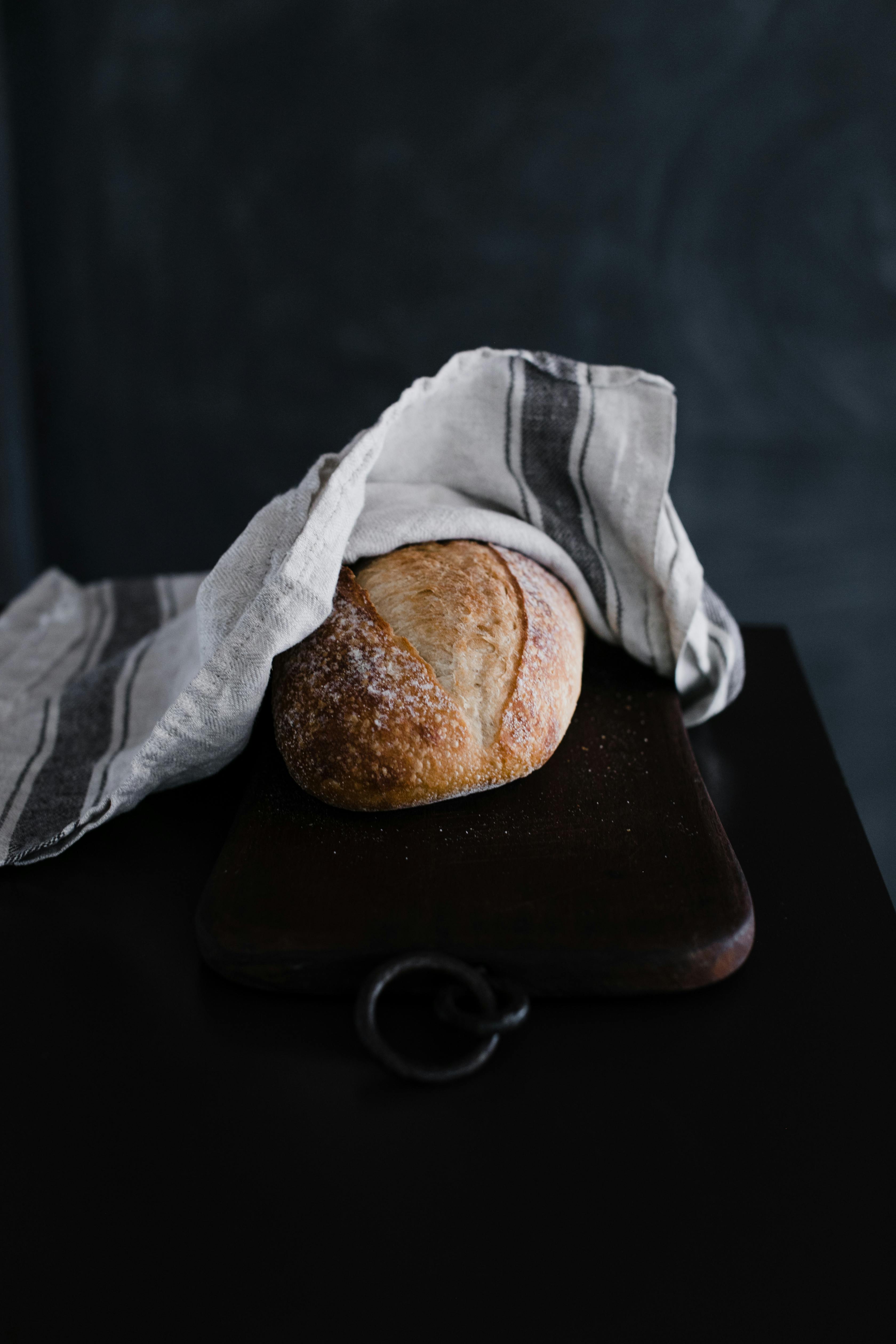 A Bread on a Brown Wooden Tray · Free Stock Photo