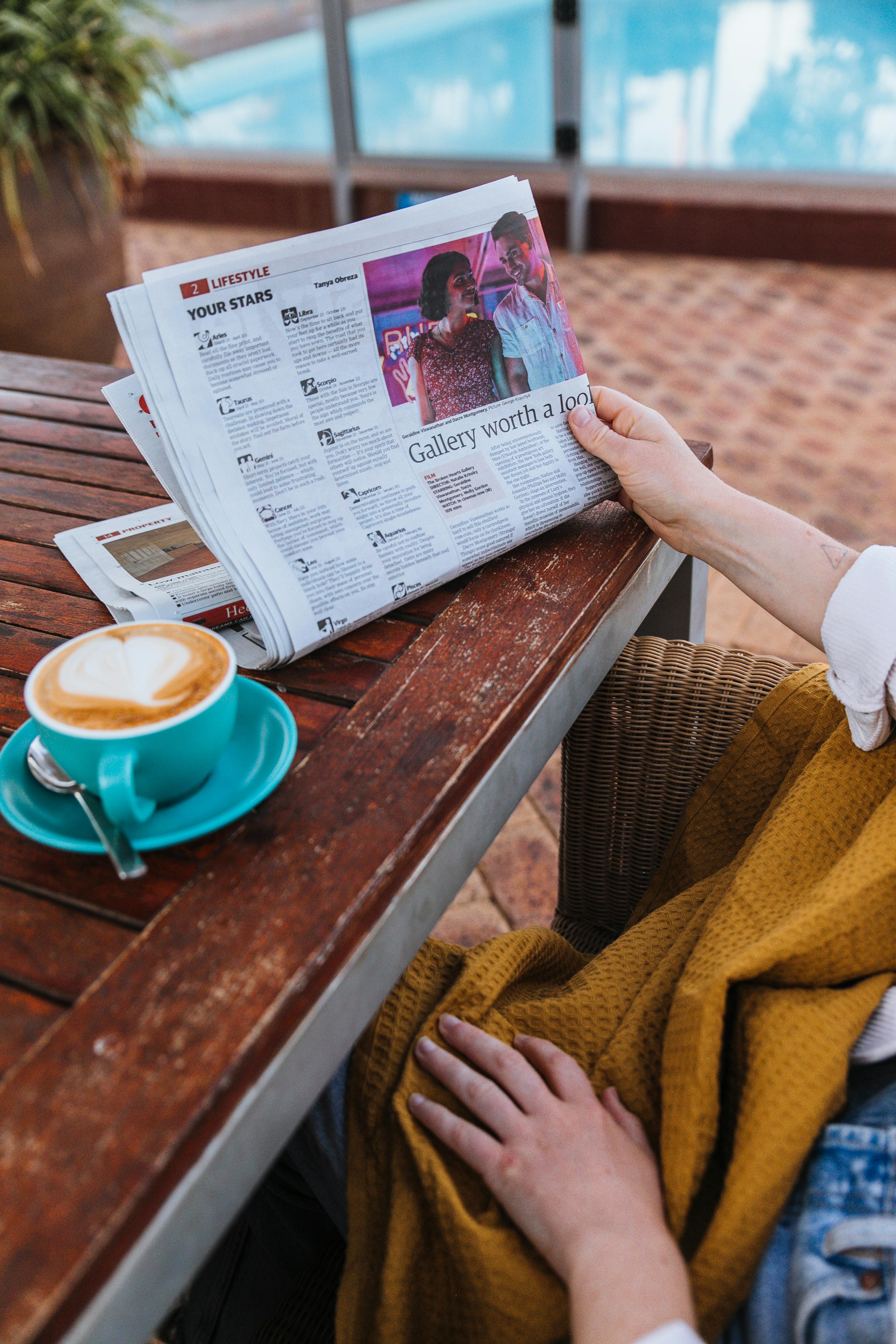 A Person Reading a Newspaper · Free Stock Photo