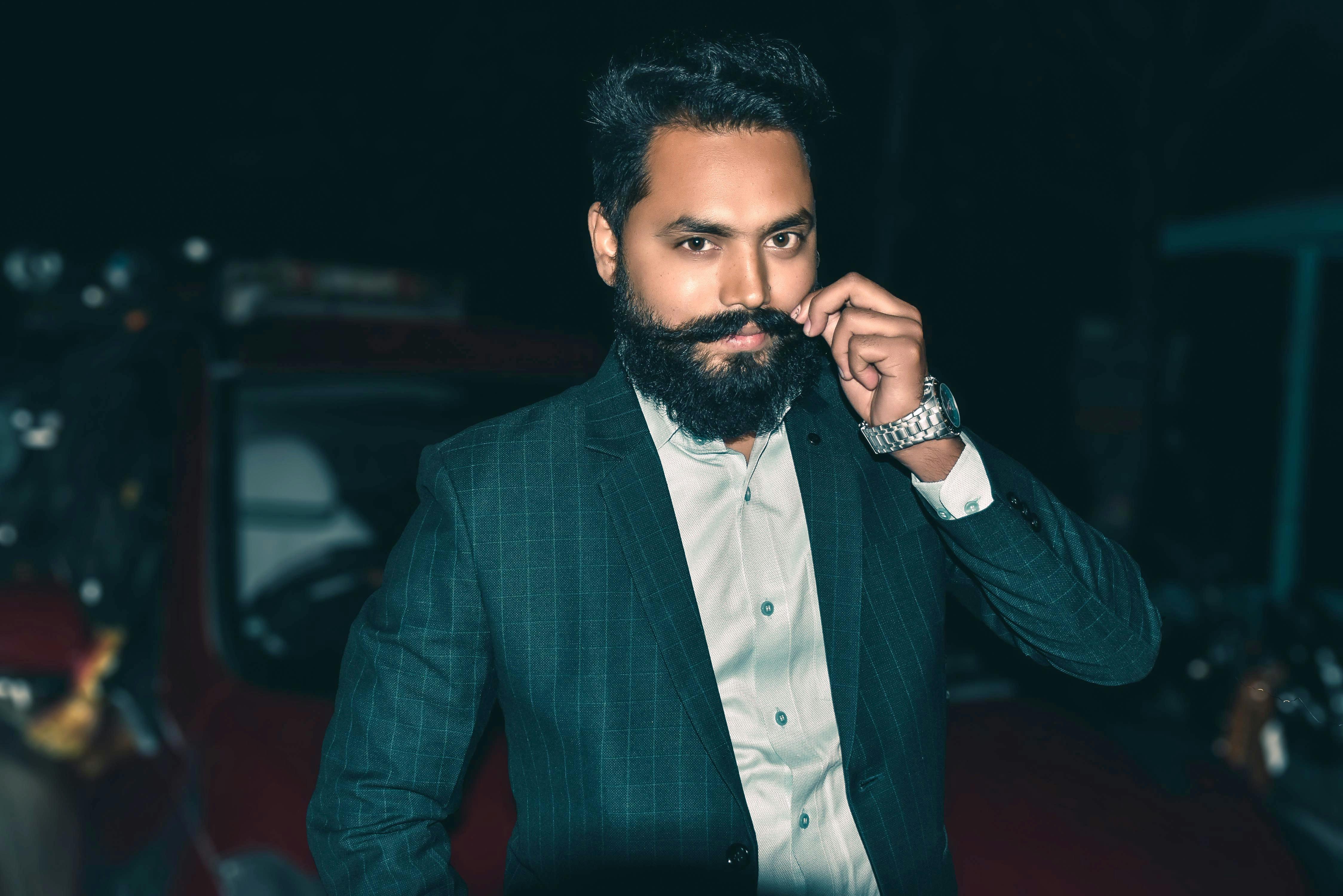 A Bearded Man Wearing a Suit · Free Stock Photo