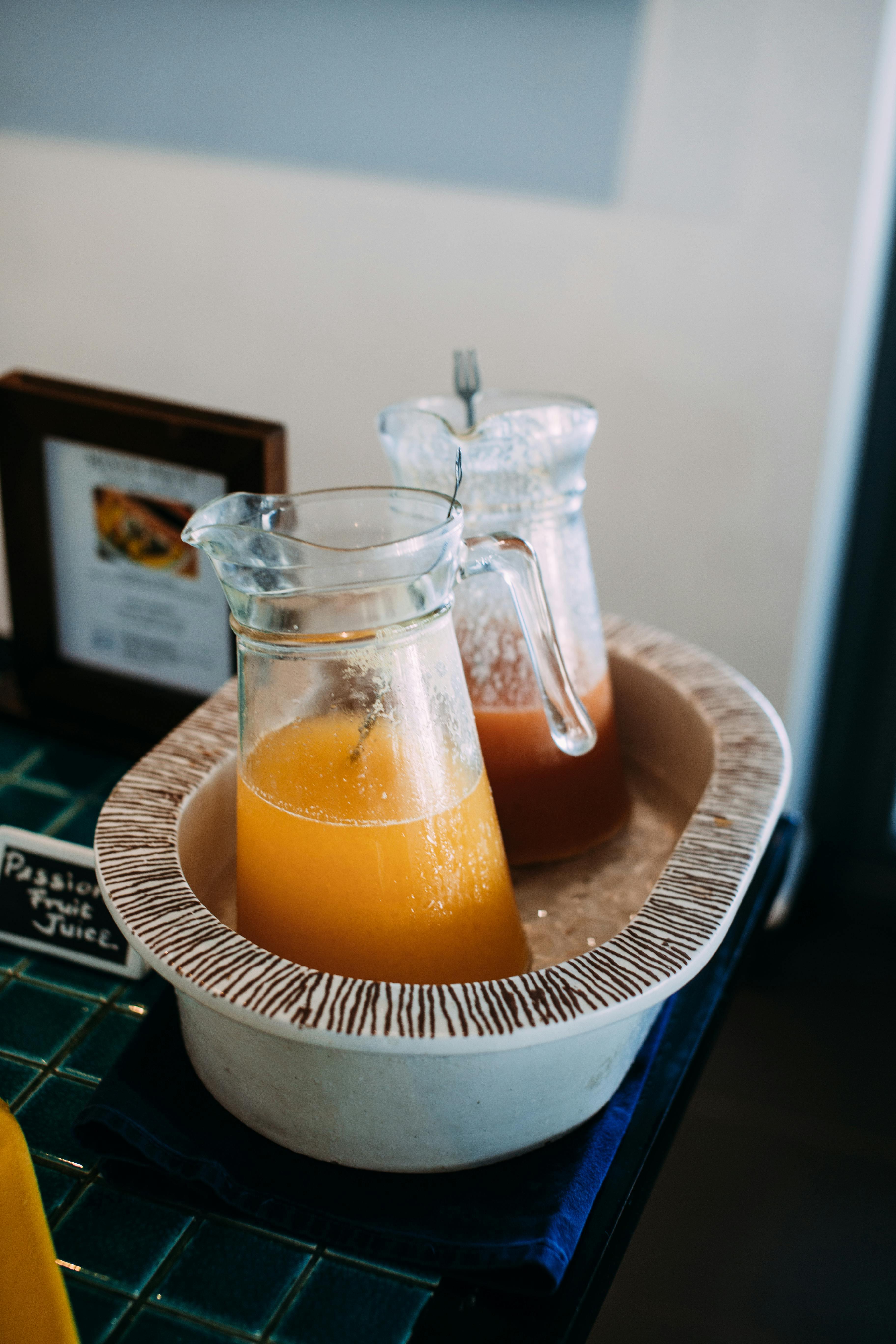 Clear Glass Pitchers With Fruit Juice · Free Stock Photo